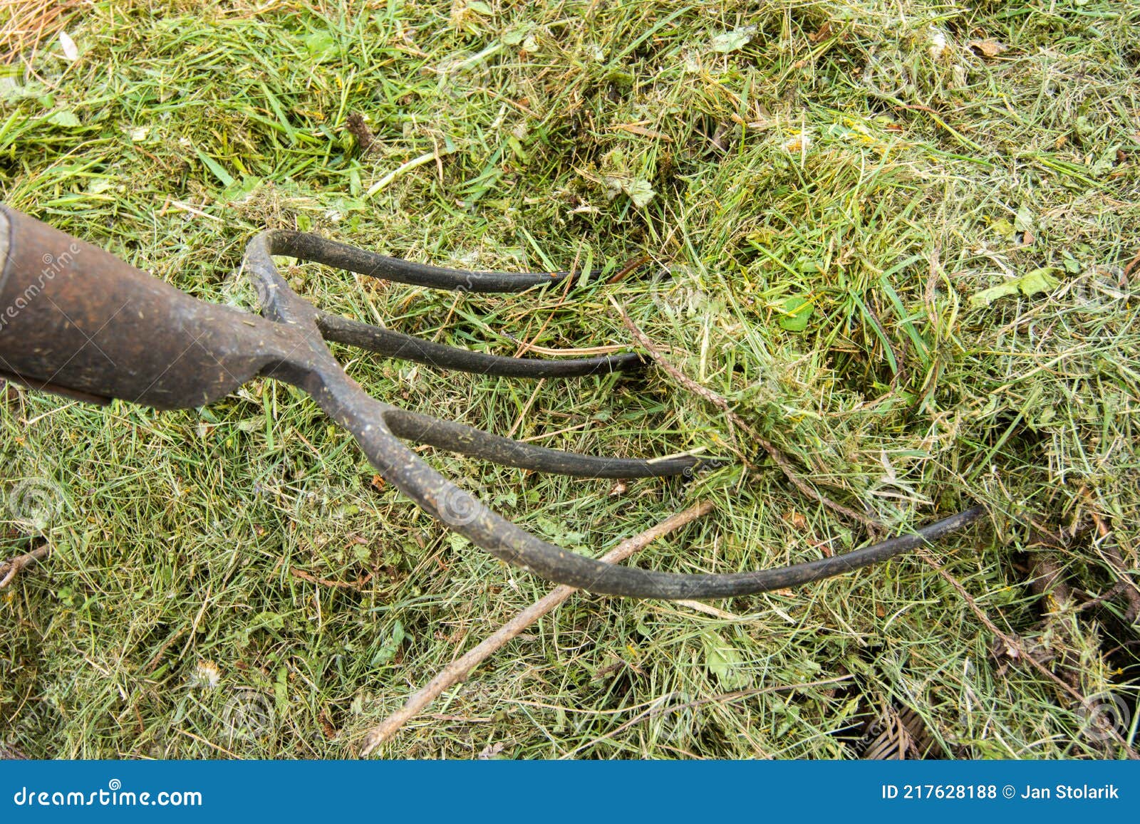 Stuck Pitchfork in a Haystack. Close-up View Stock Photo - Image of ...