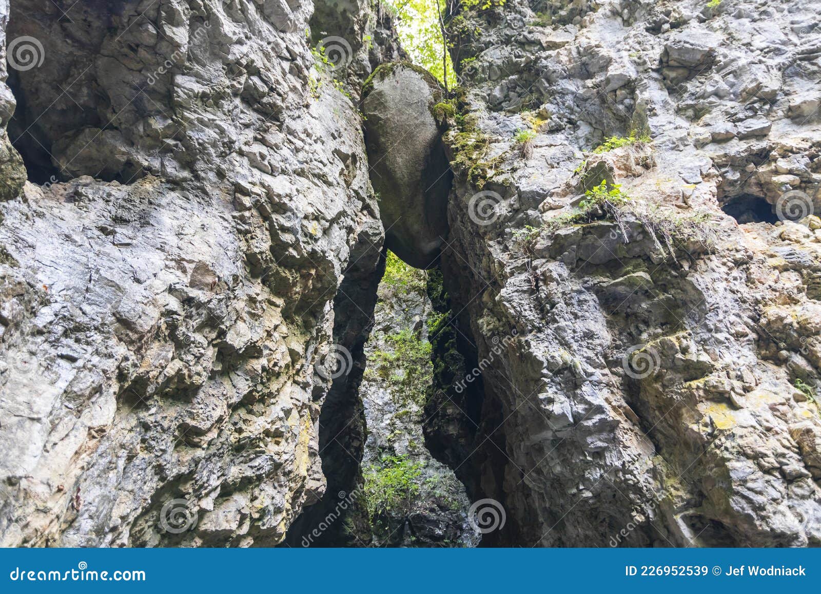 Stuck Between A Rock And A Hard Place Down A Very Narrow Alley Stock ...