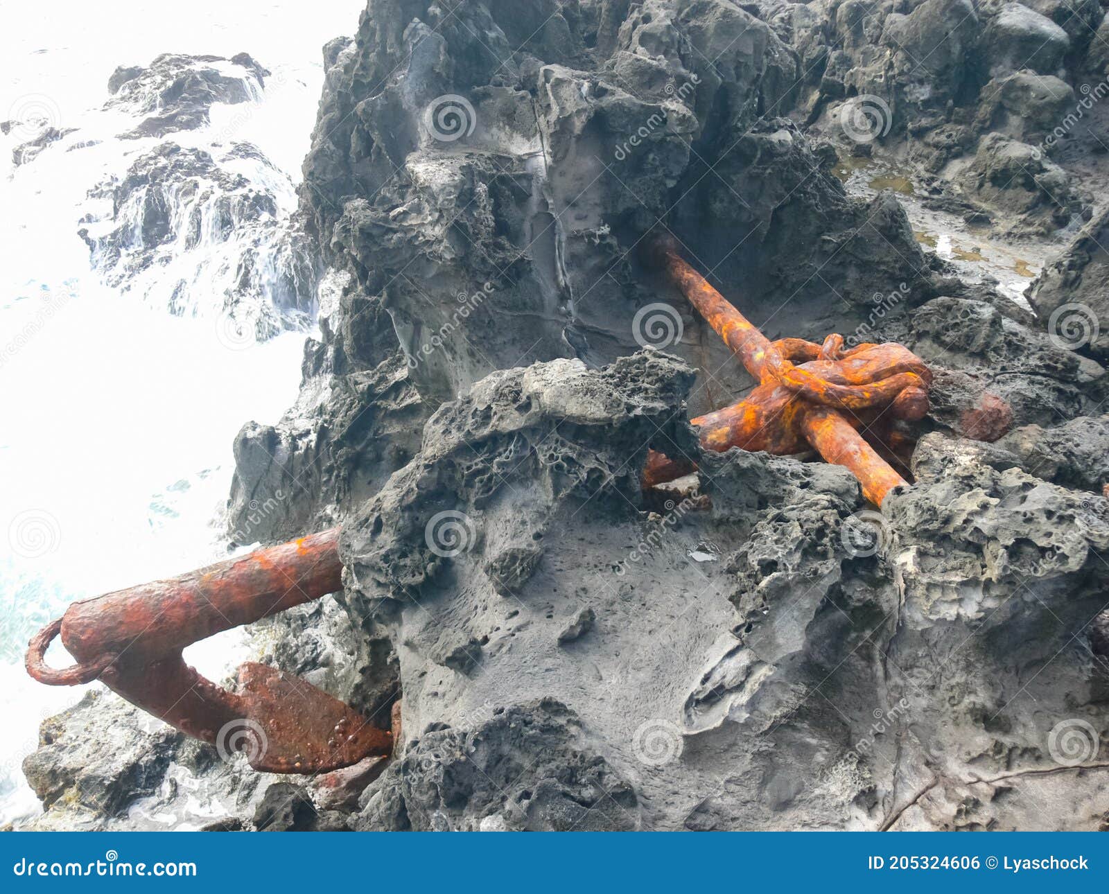 Stuck in the Stone is an Old Anchor from Ship Stock Photo - Image of ...