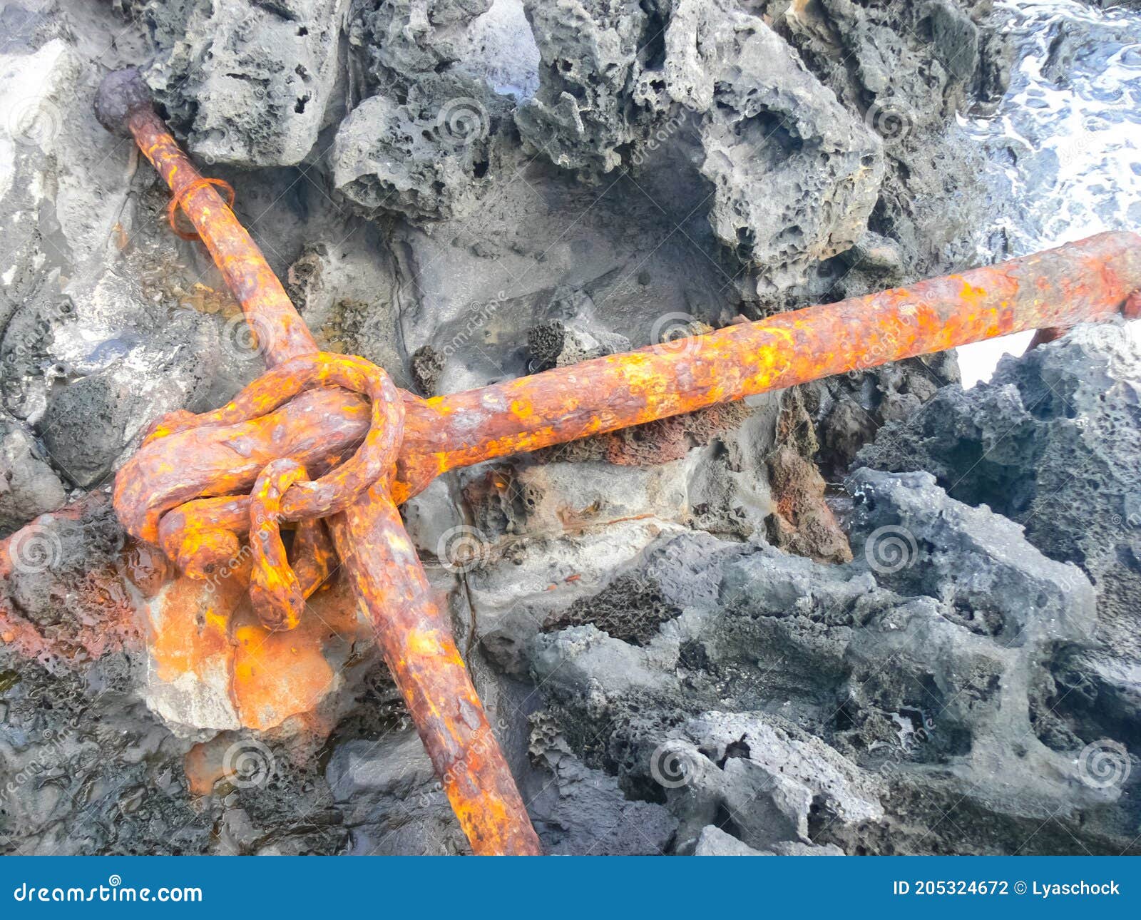 Stuck in the Stone is an Old Anchor from Ship Stock Photo - Image of ...