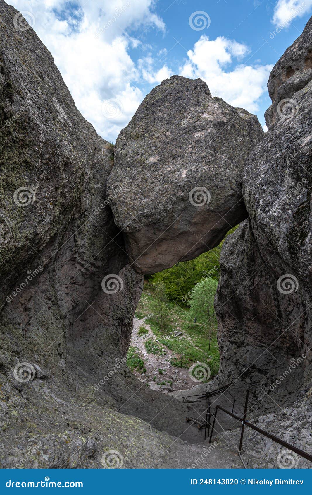Stuck stone in the rocks stock photo. Image of stuck - 248143020
