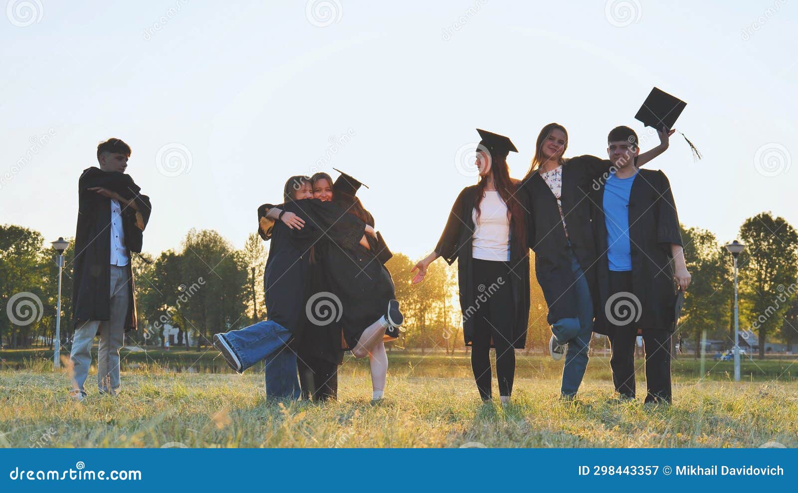 Student Alumni Waving at Sunset. Stock Image - Image of portrait, high ...