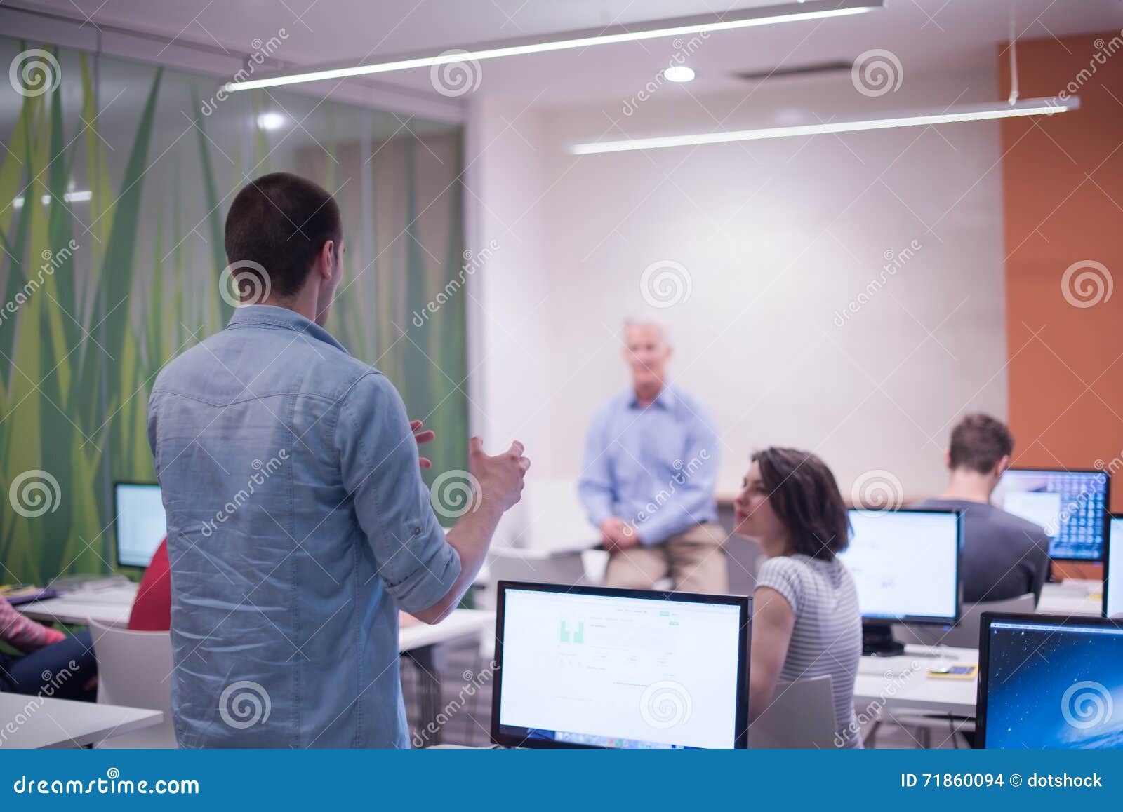 Student Answering a Question in Classroom Stock Photo - Image of desk ...