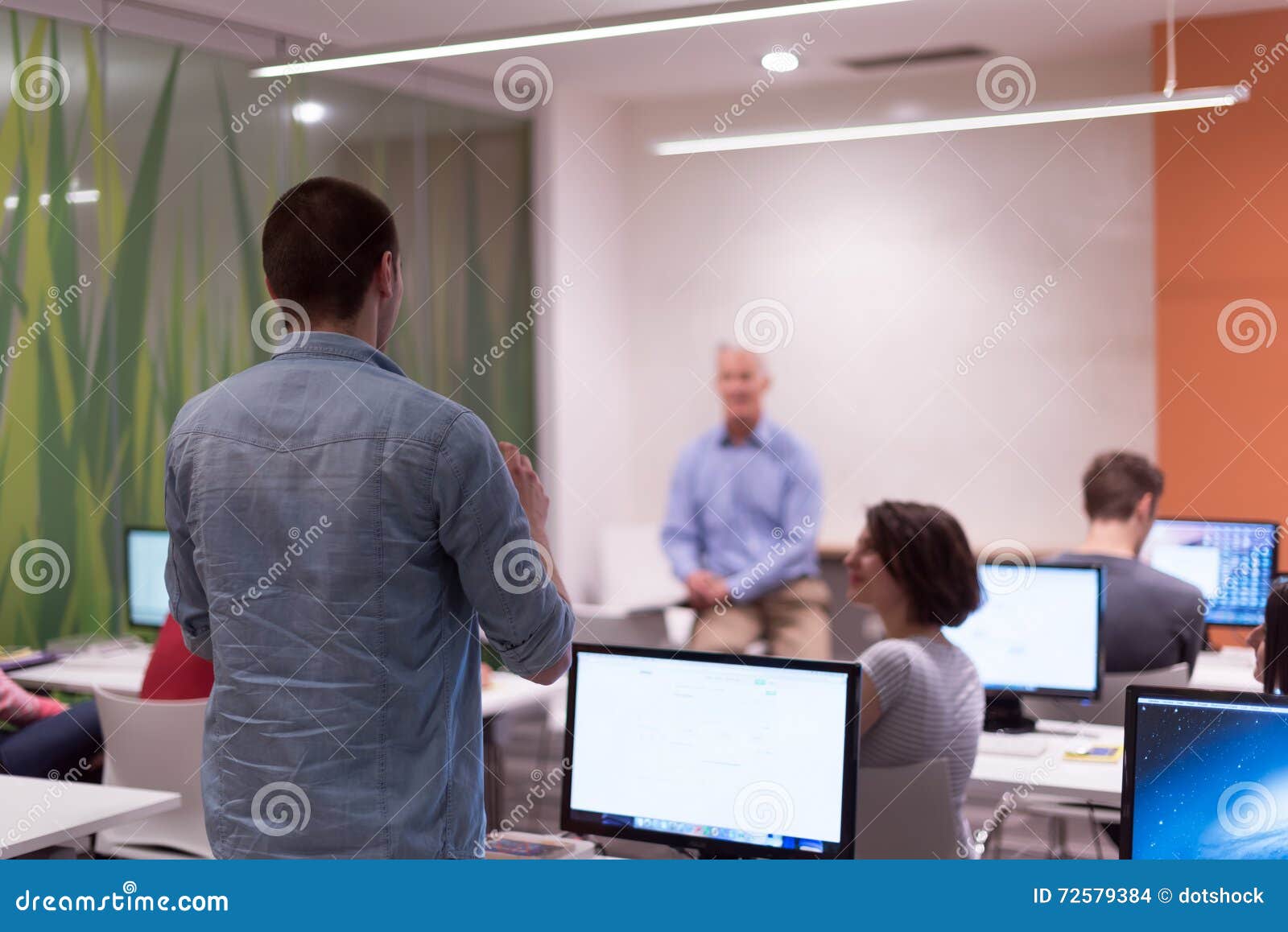 Student Answering a Question in Classroom Stock Photo - Image of desk ...