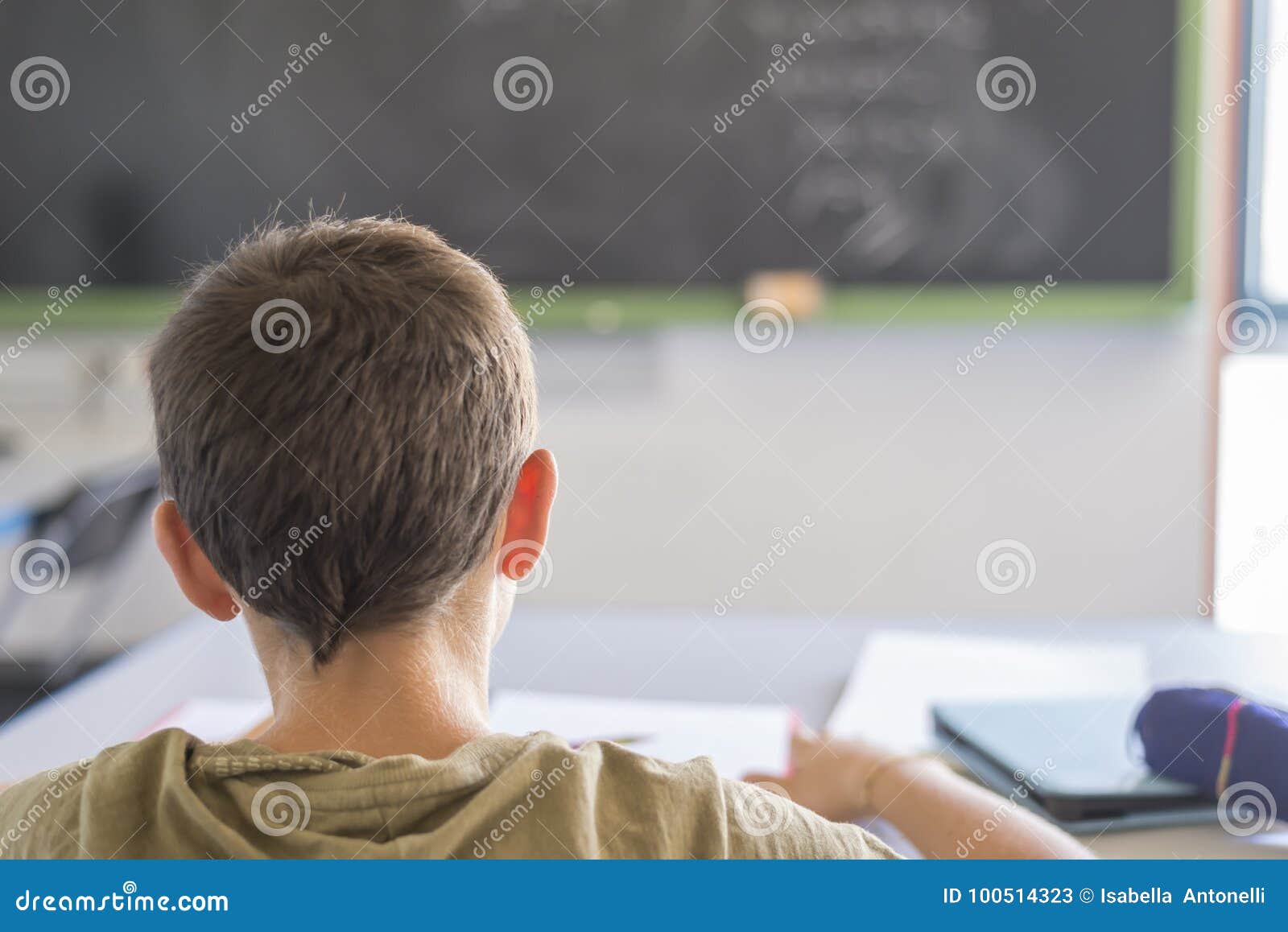 Student Attending in a Classroom during a Lesson Stock Image - Image of ...