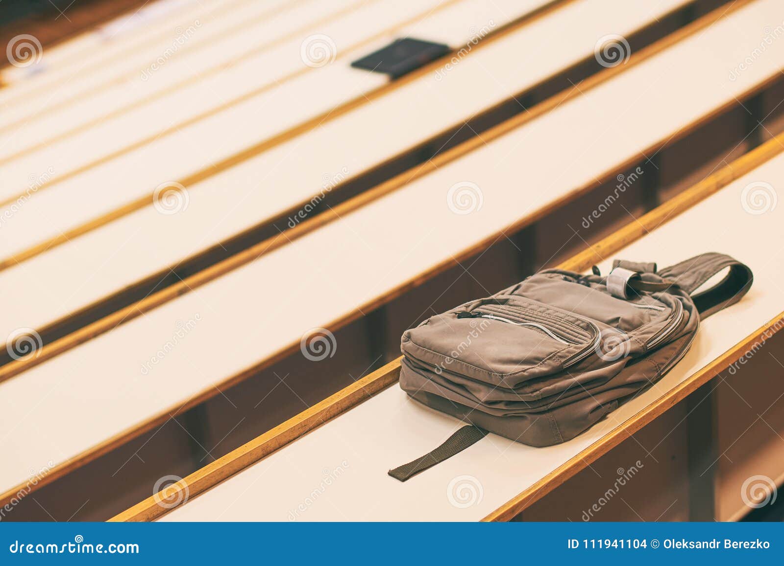 Student Backpack Bag on the Desk in University Auditorium Stock Photo ...