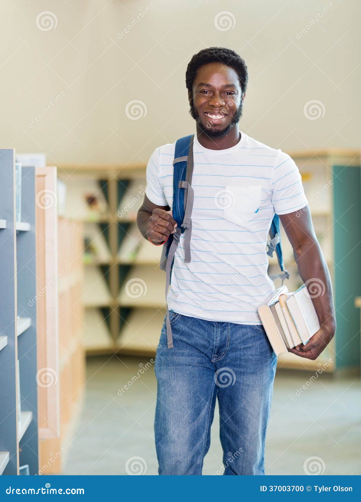 Student with Backpack and Books in Library Stock Photo - Image of book ...