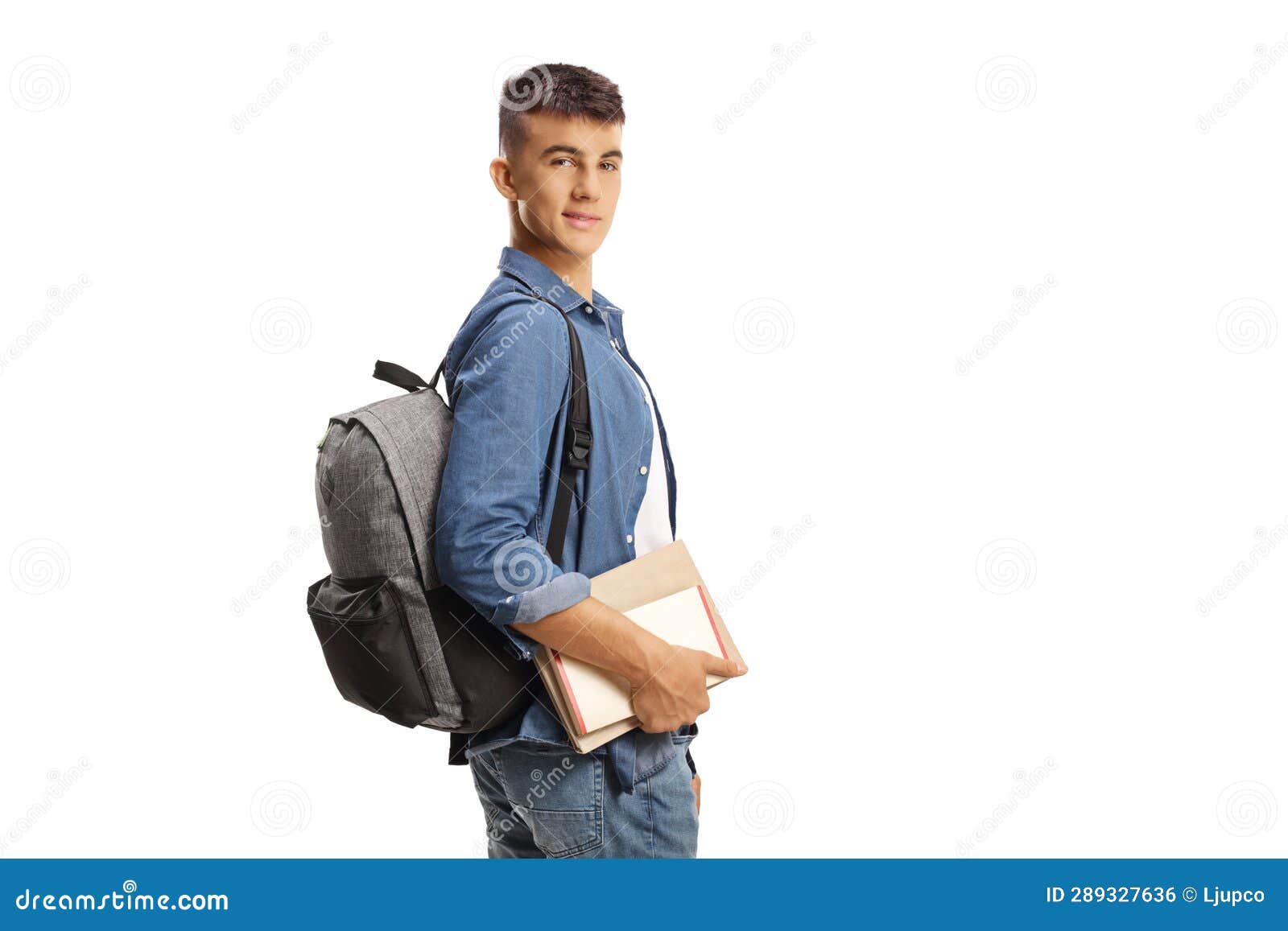 Student with a Backpack and Books Looking Over Shoulder Stock Photo ...