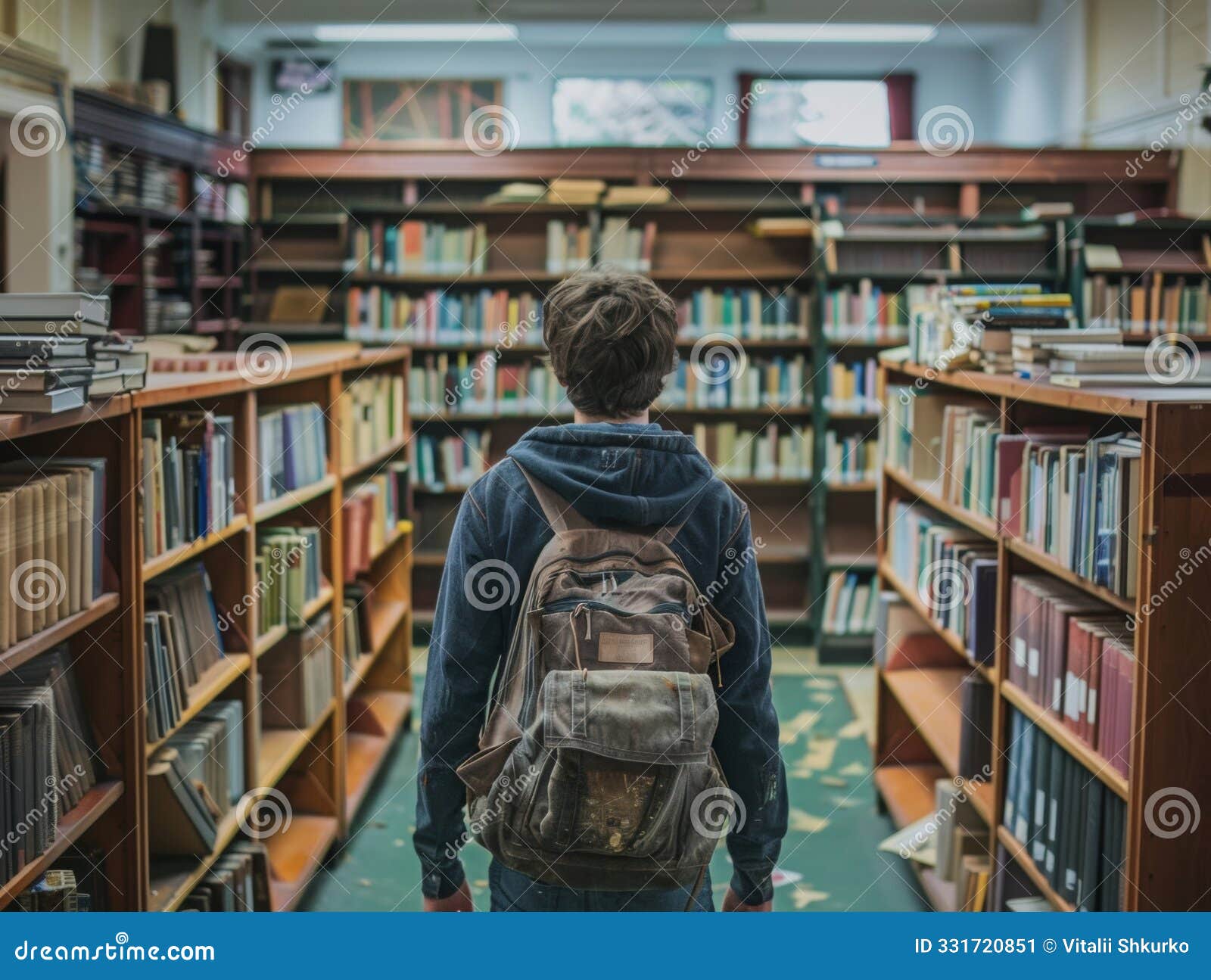 A Student with a Backpack Explores the Shelves of a Library, Surrounded ...