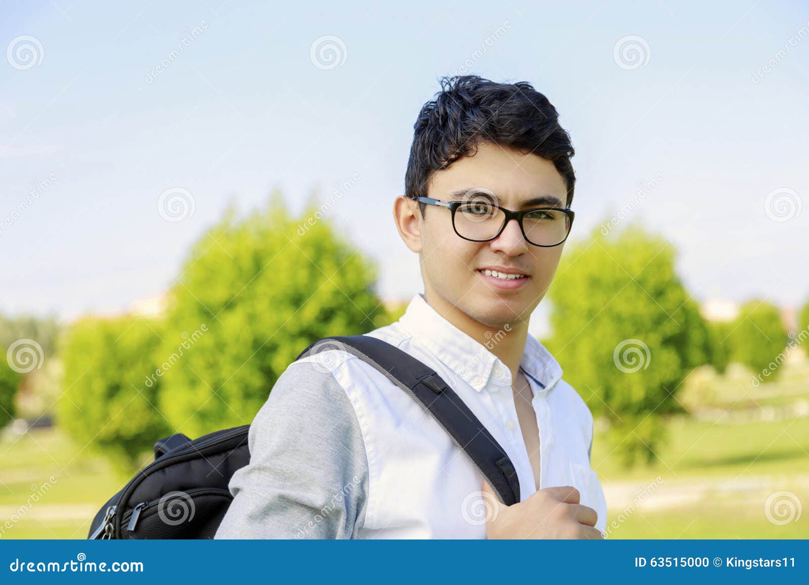 Student with Backpack Outside School. Stock Photo - Image of male ...