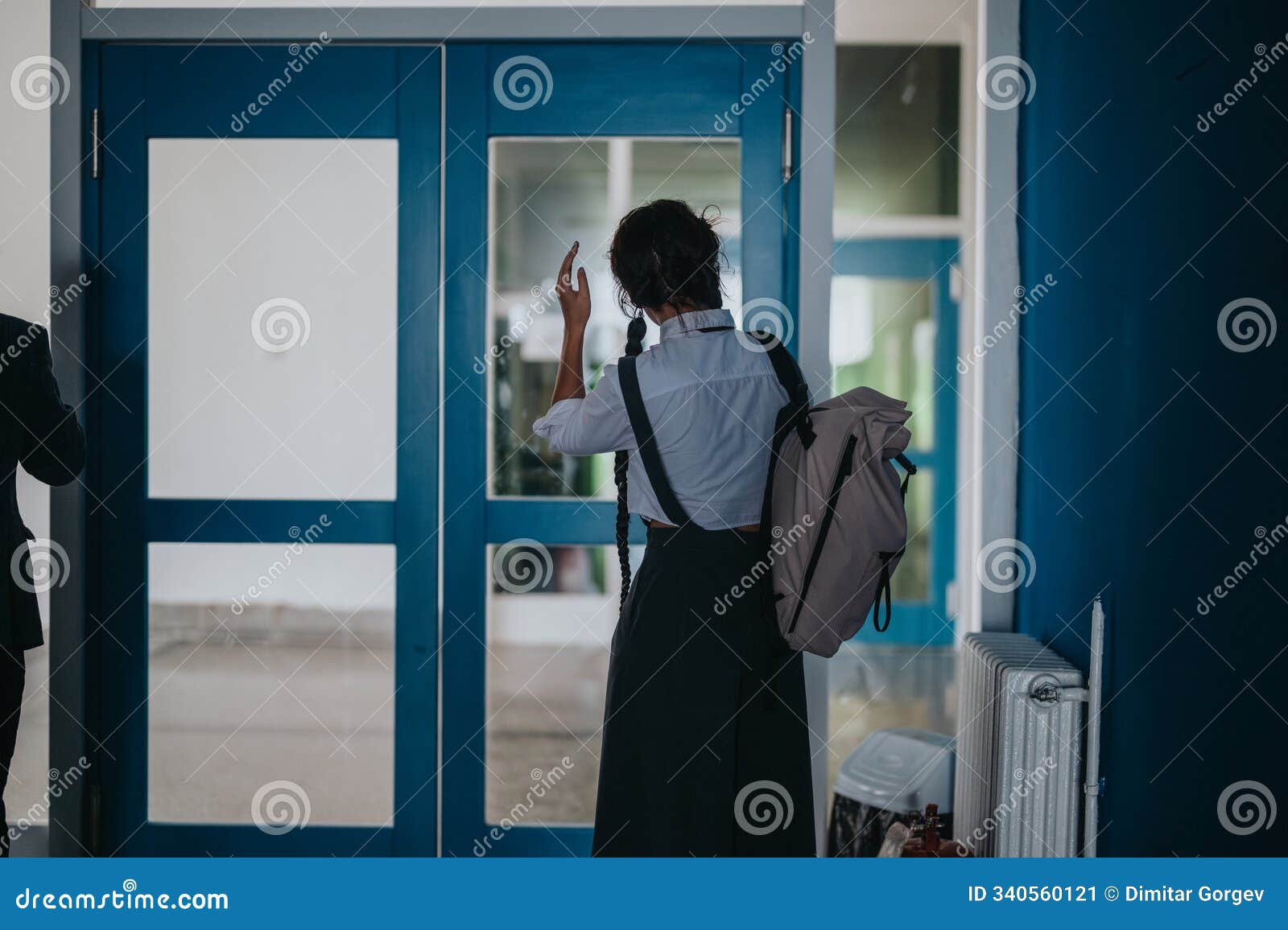 Student Interacting with Professor Outside Classroom during a Break ...