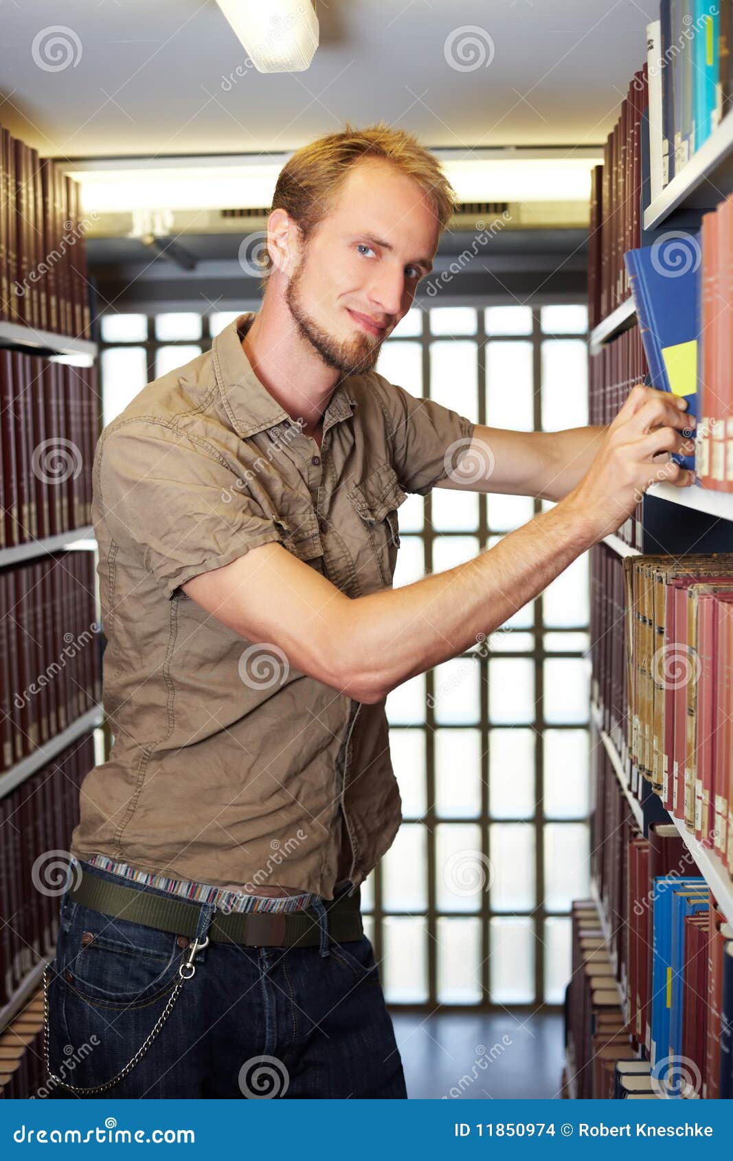 Student on book shelf stock photo. Image of public, read - 11850974