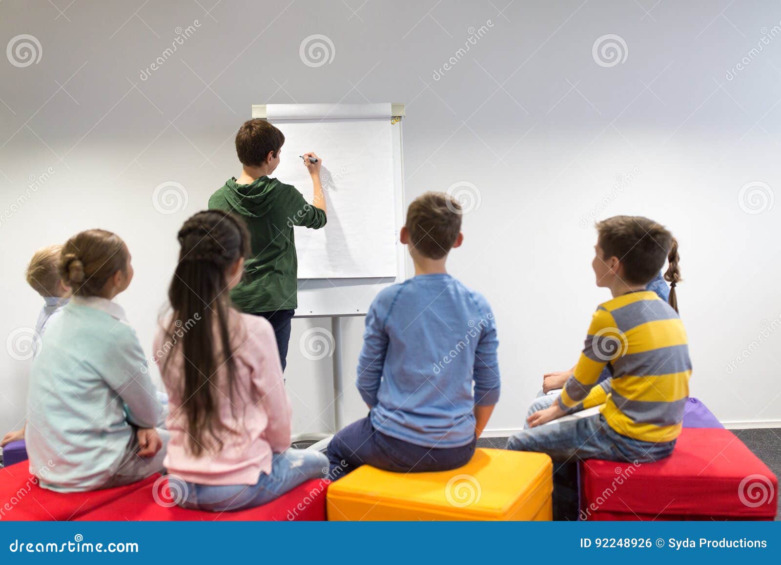 Student Boy with Marker Writing on Flip Board Stock Photo - Image of ...