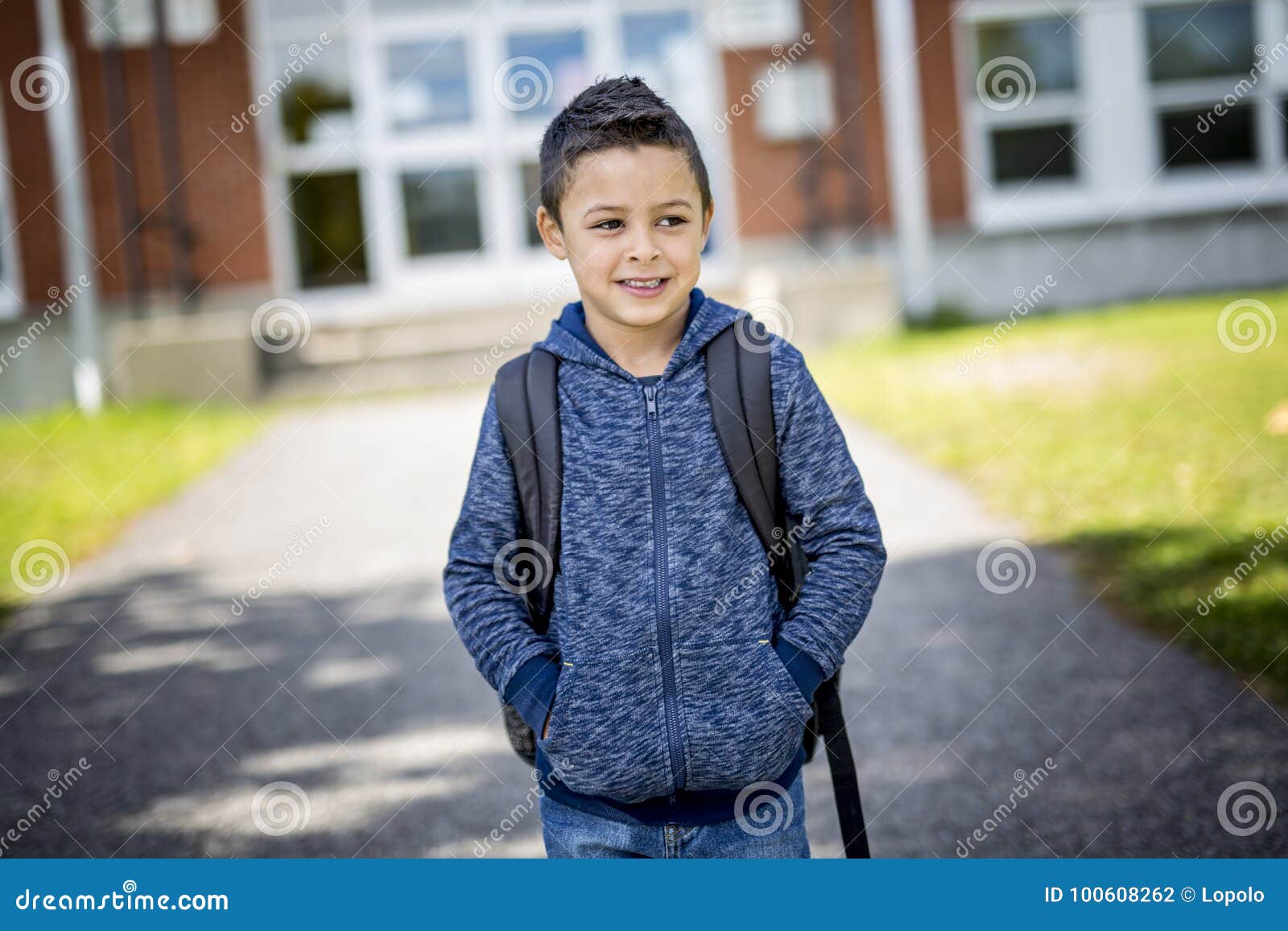 Student Outside School Standing Smiling Stock Photo - Image of ...