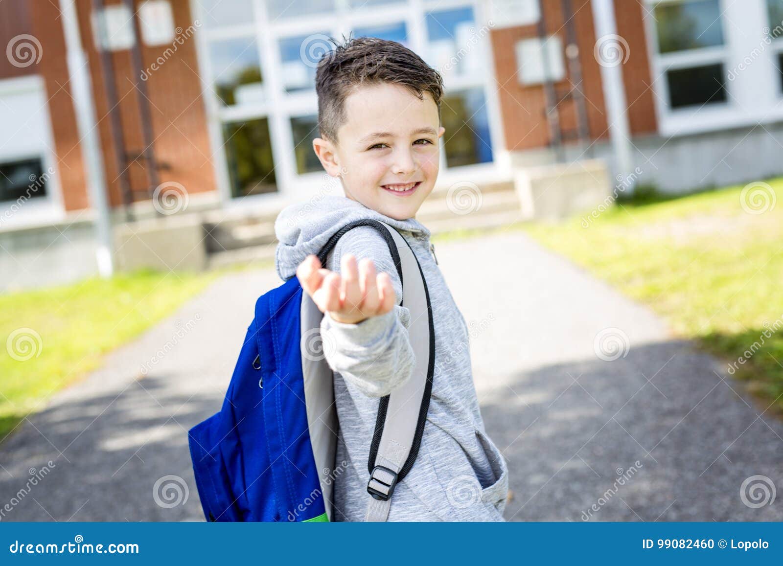 Student Outside School Standing Smiling Stock Photo - Image of smiling ...