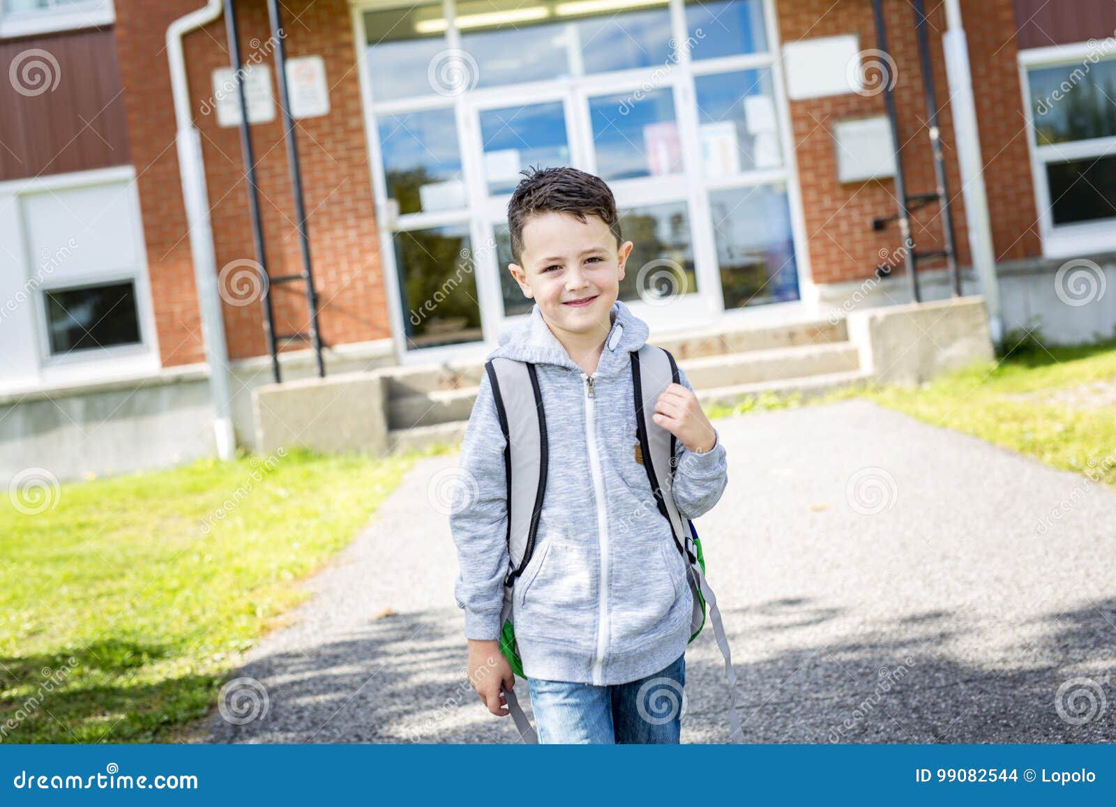 Student Outside School Standing Smiling Stock Photo - Image of cute ...