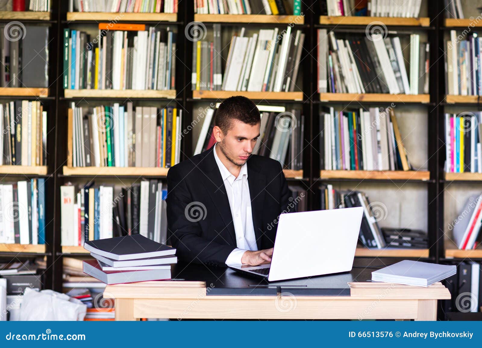 Student Boy Working on a Laptop in the Library Stock Photo - Image of ...