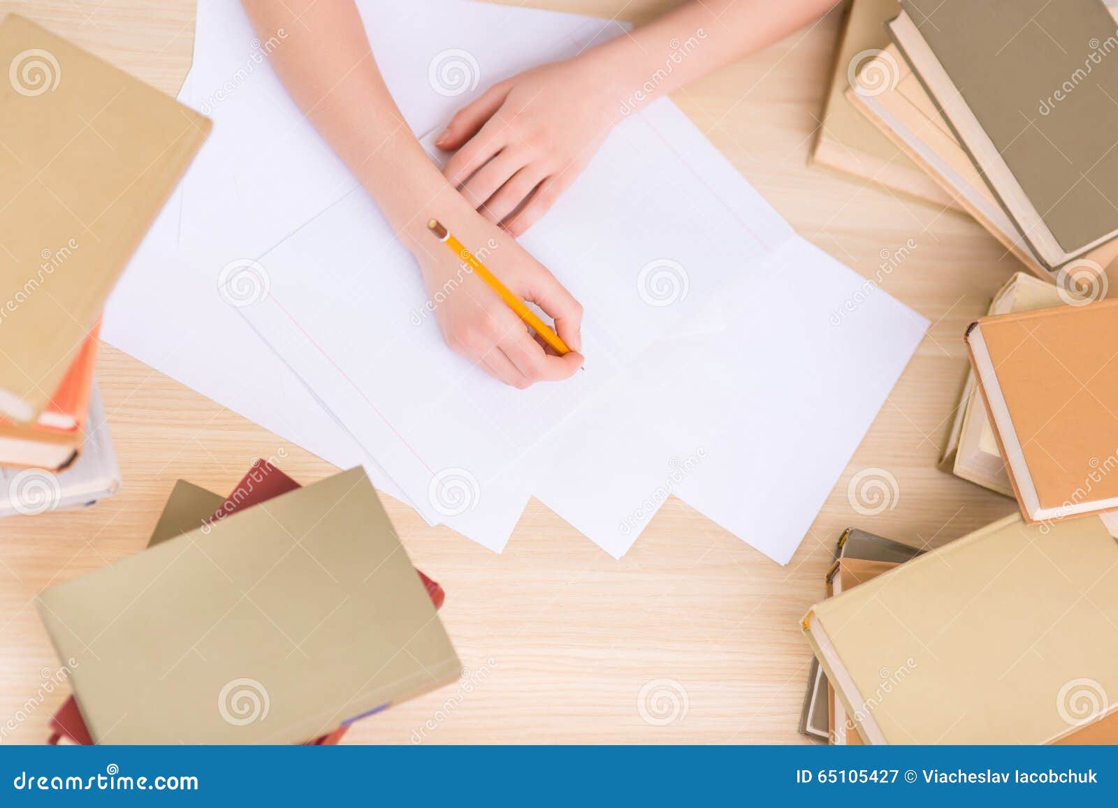 Student is Busy Writing at the Desk Stock Image - Image of textbooks ...
