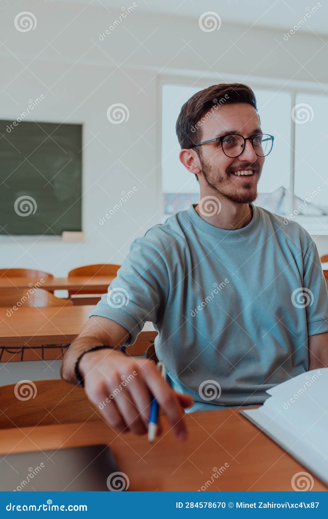 The Student Carefully Follows the Lessons in a Modern Classroom Stock ...