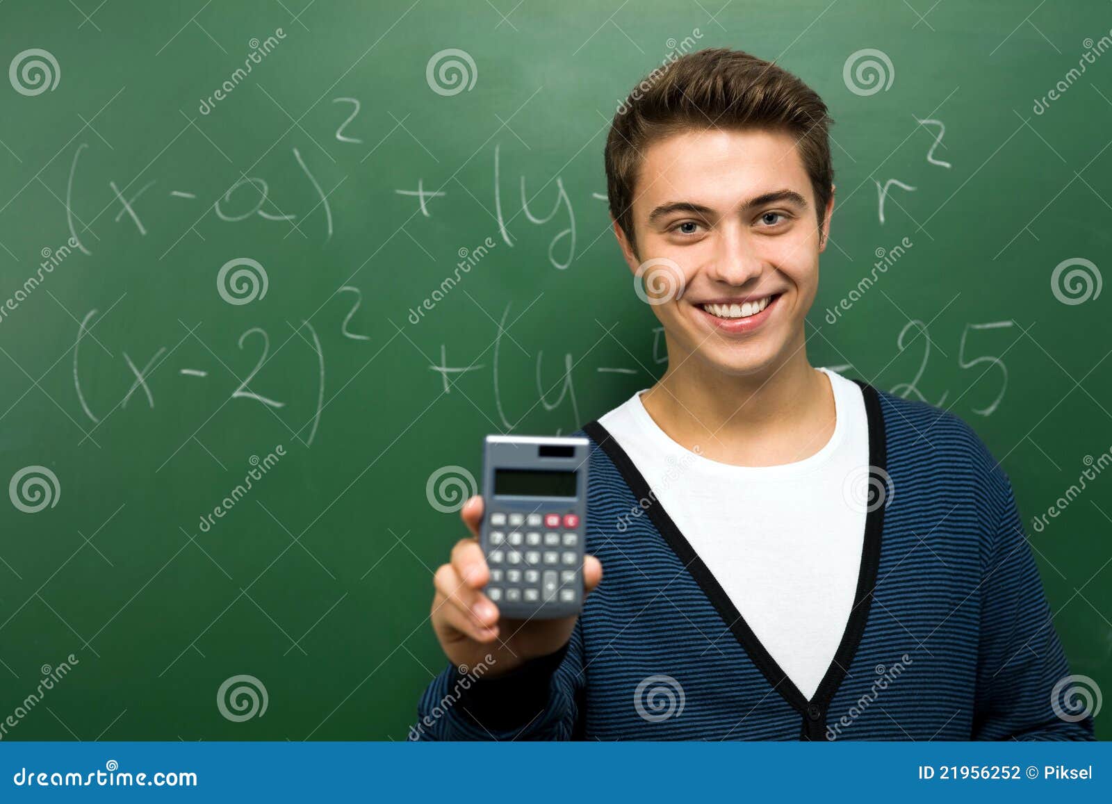 Student by Chalkboard Holding Calculator Stock Photo - Image of math ...