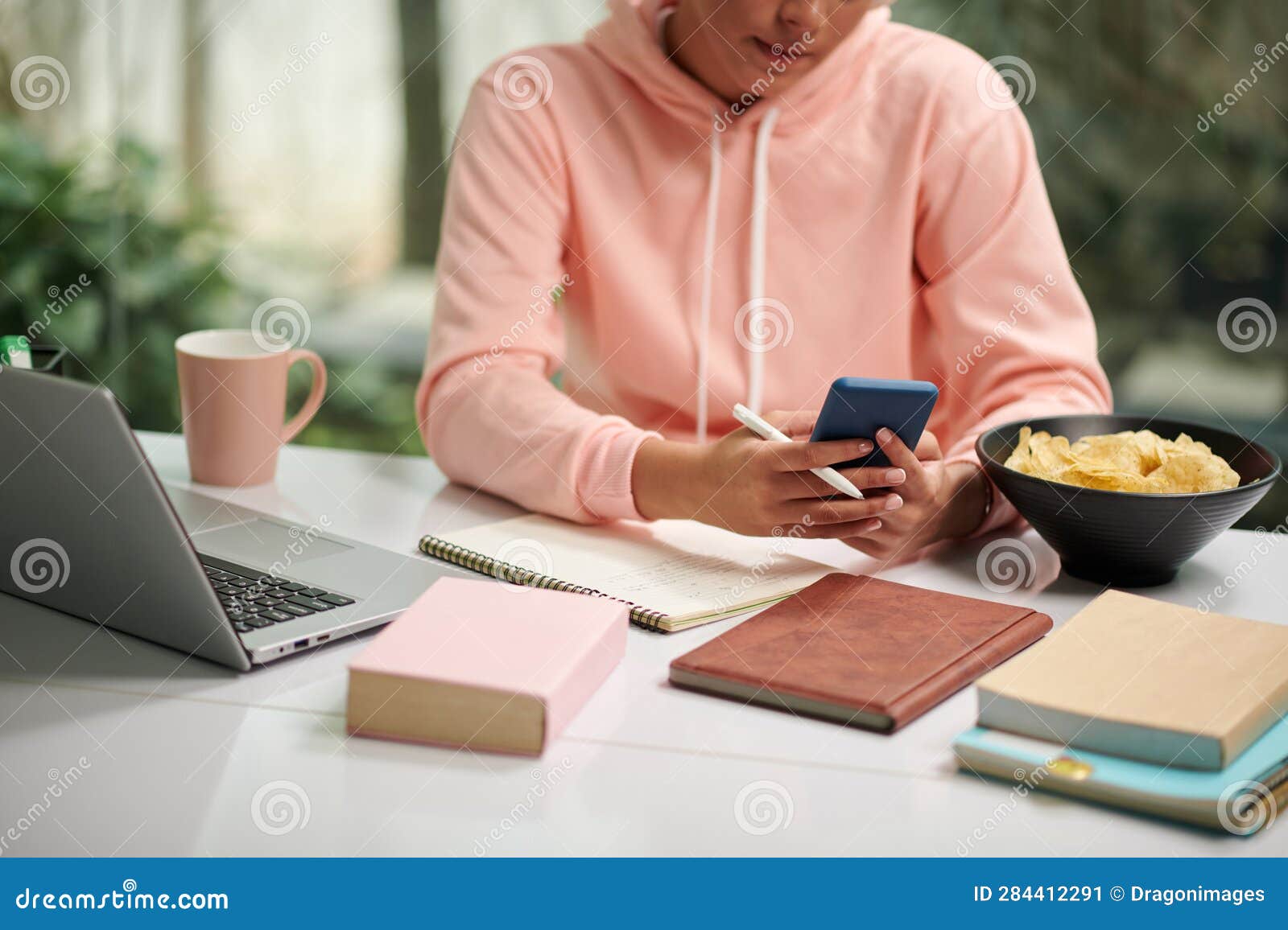 Student Checking Messages stock image. Image of article - 284412291