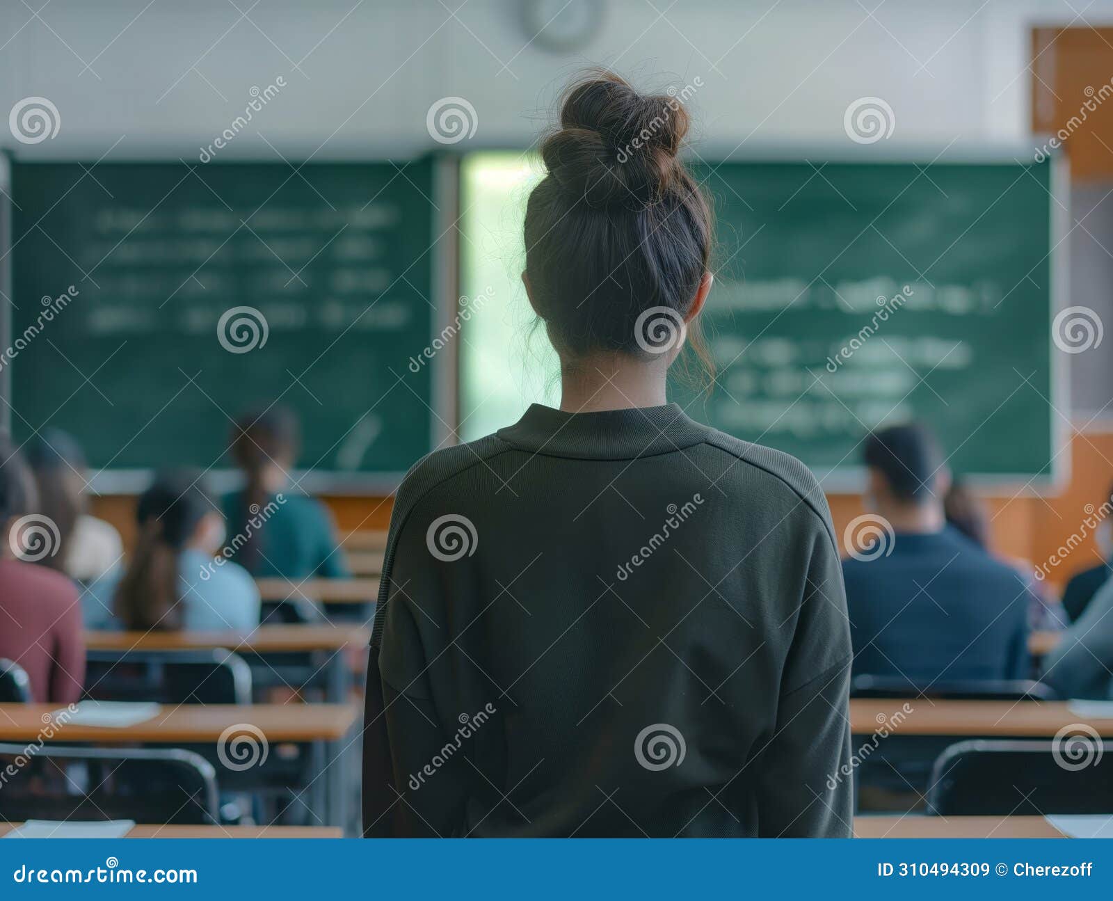 Student in Classroom Facing Blackboard Stock Image - Image of ...