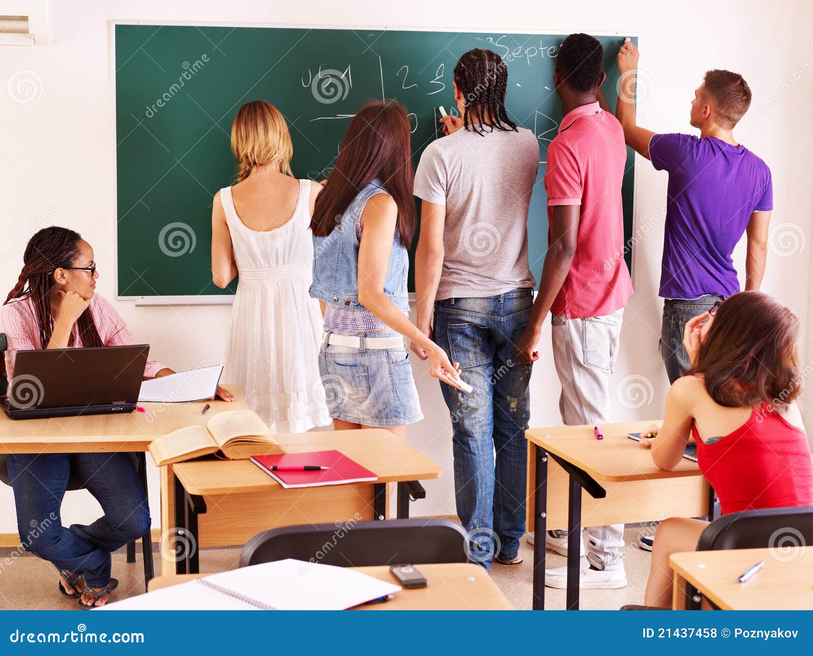 Student in Classroom Near Blackboard. Stock Photo - Image of learning ...