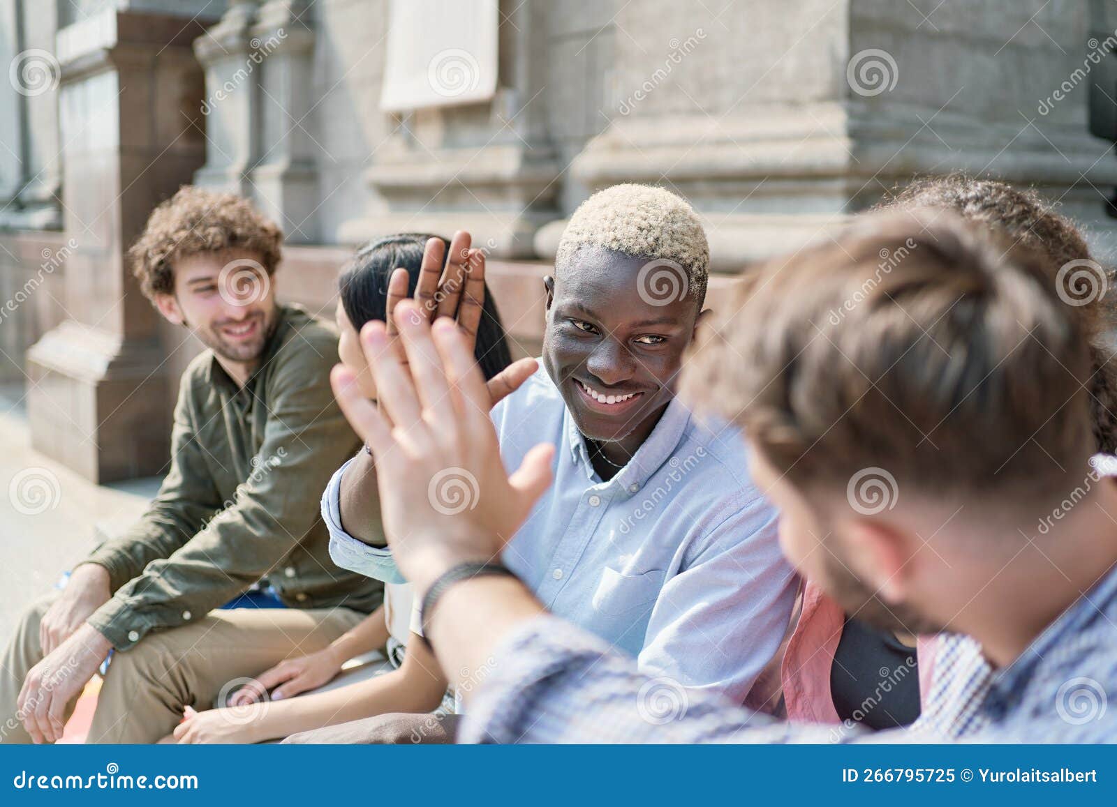 Student and Coed Giving Each Other a Friendly High Five. Stock Image ...