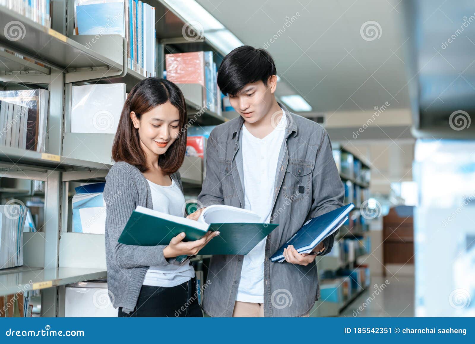 Student College Opening and Reading a Book at Library Stock Image ...