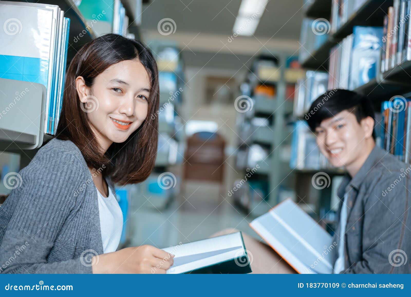 Student College Opening and Reading a Book at Library Stock Image ...