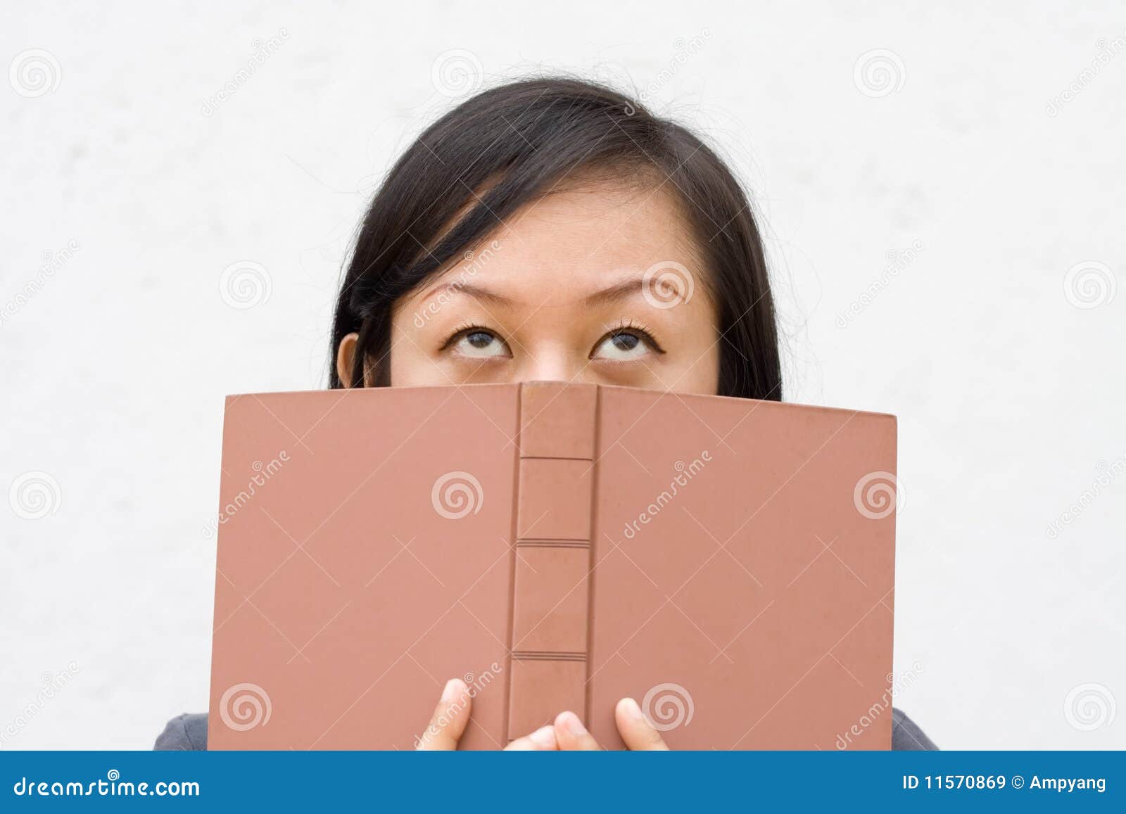 Student Covering Her Face with Book Stock Image - Image of thinking ...