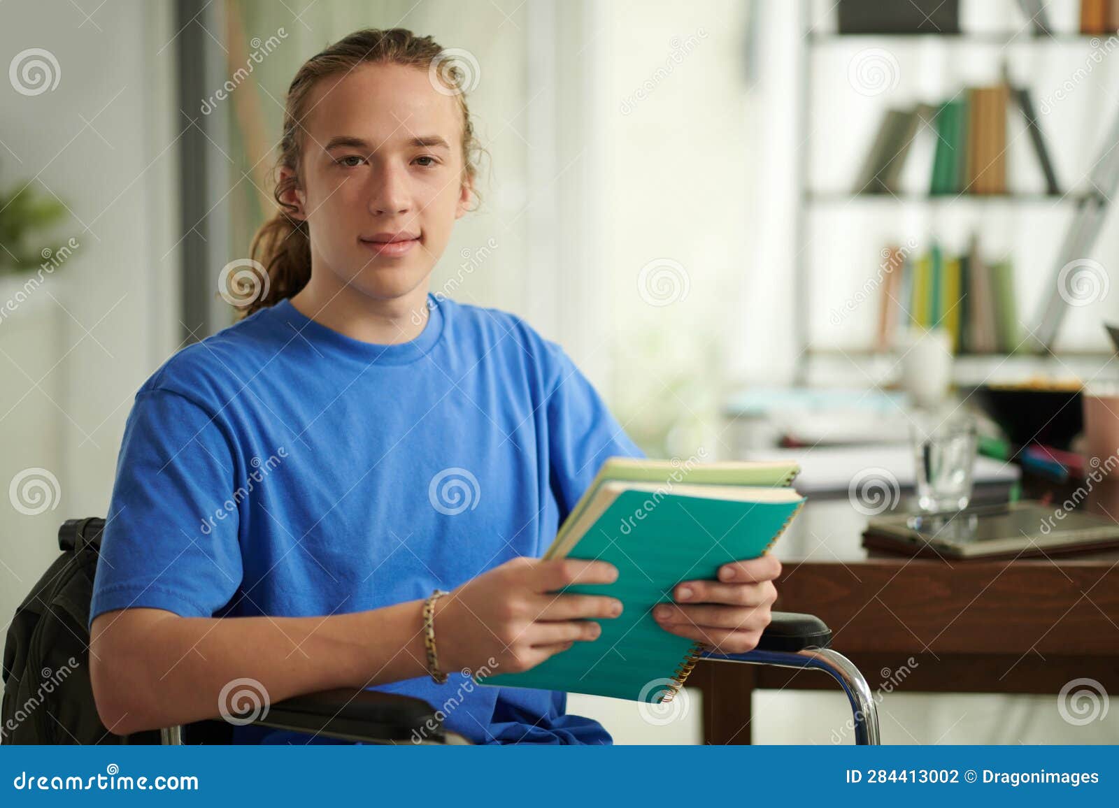 Student with Disability Studying in Library Stock Photo - Image of ...