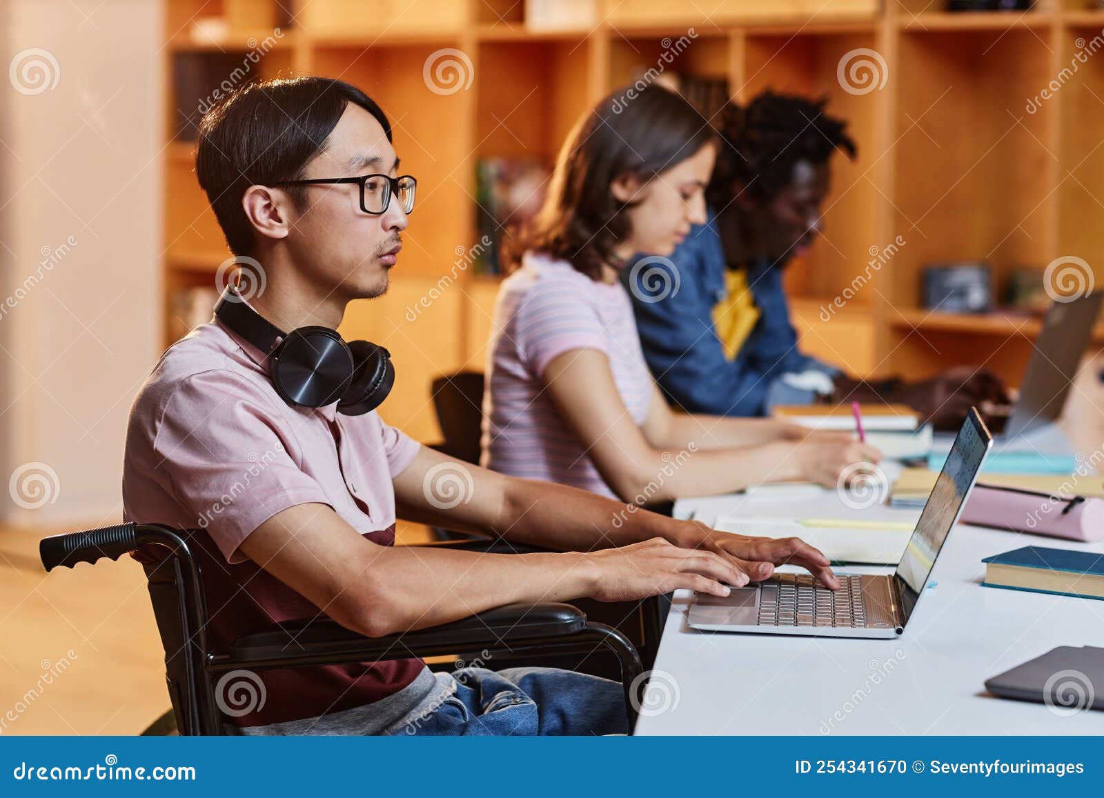 Student with Disability Using Laptop Stock Photo - Image of working ...