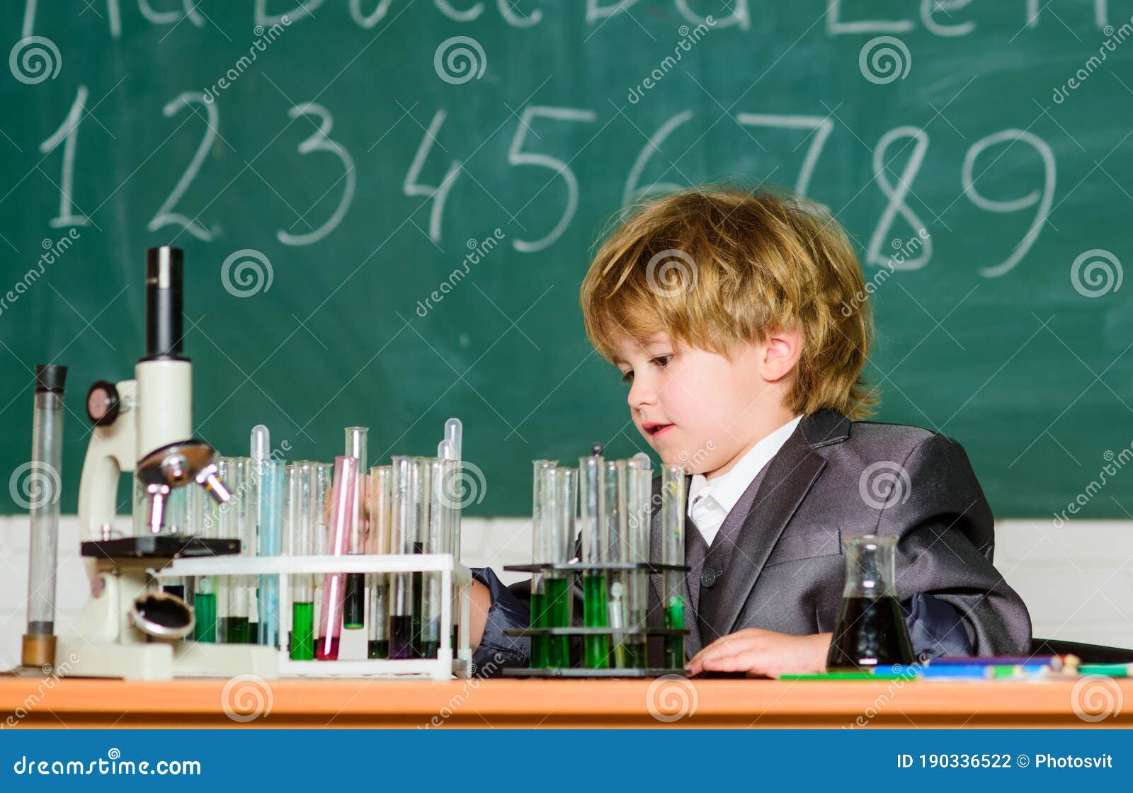 Student Do Science Experiment with Microscope in Lab. Small Boy at ...