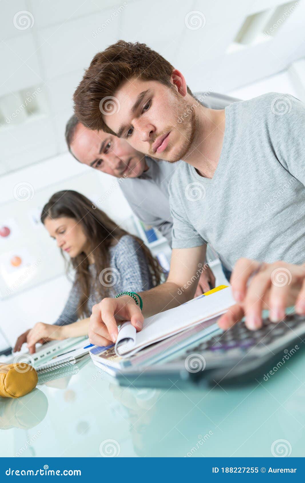 Student Doing Finances in Classroom Stock Image - Image of examining ...
