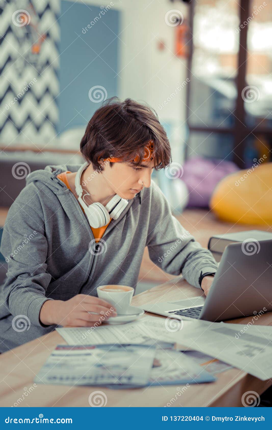 Student Doing His Homework Using a Laptop Stock Photo - Image of ...
