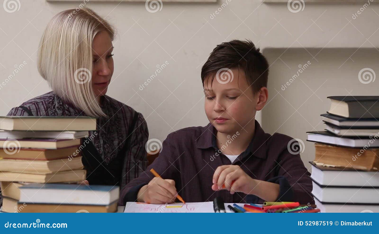 Student Doing Homework with the Help of a Tutor. Stock Video - Video of ...