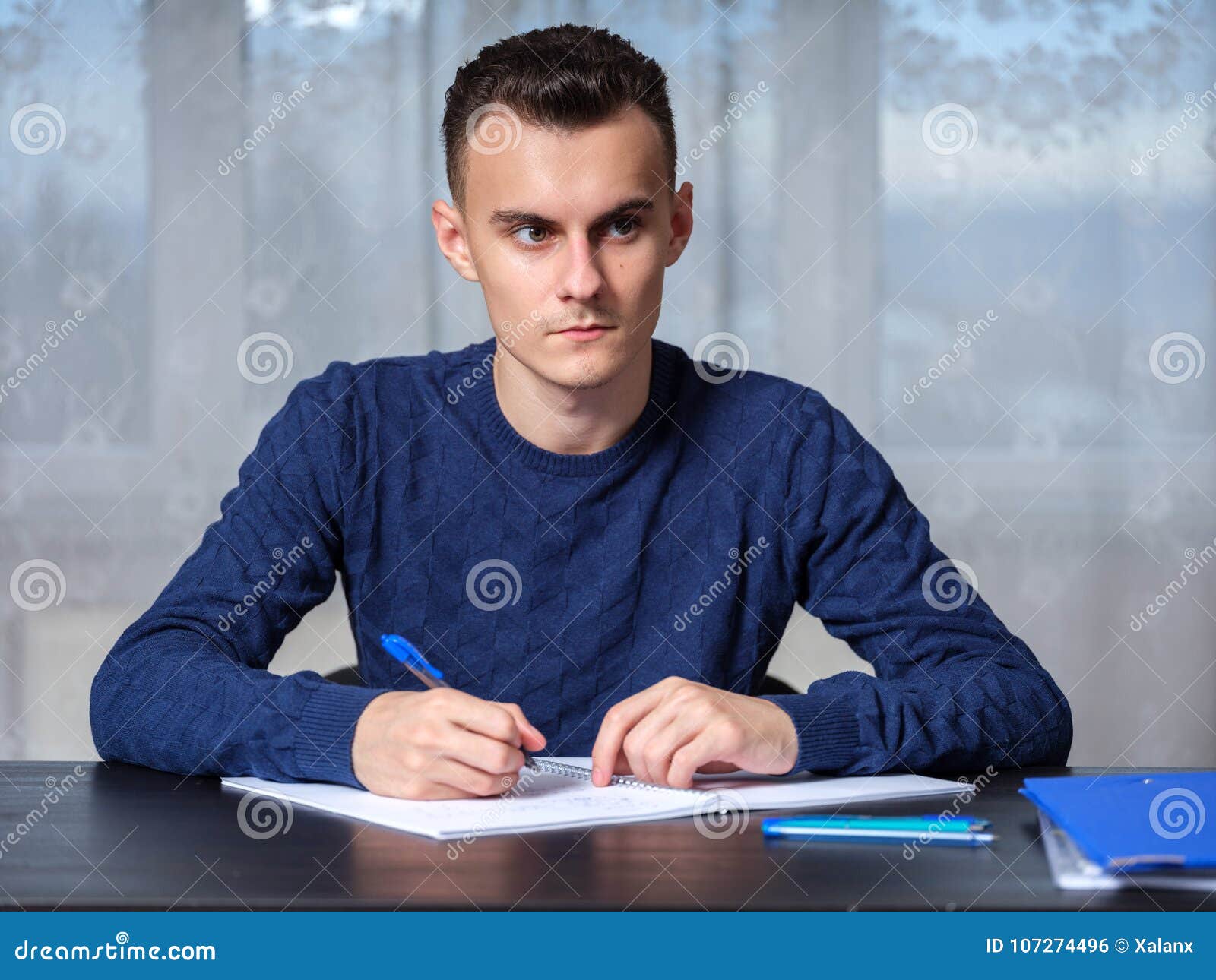 Student doing homework stock photo. Image of college - 107274496