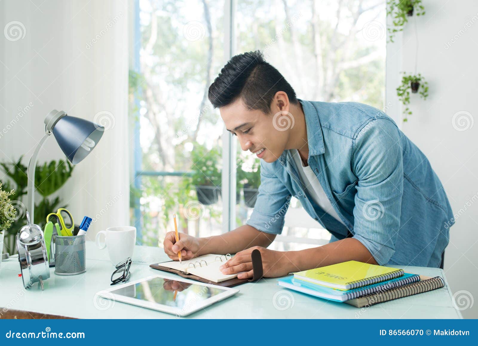 Student Doing Homework and Preparing Exam at Home. Stock Photo - Image ...