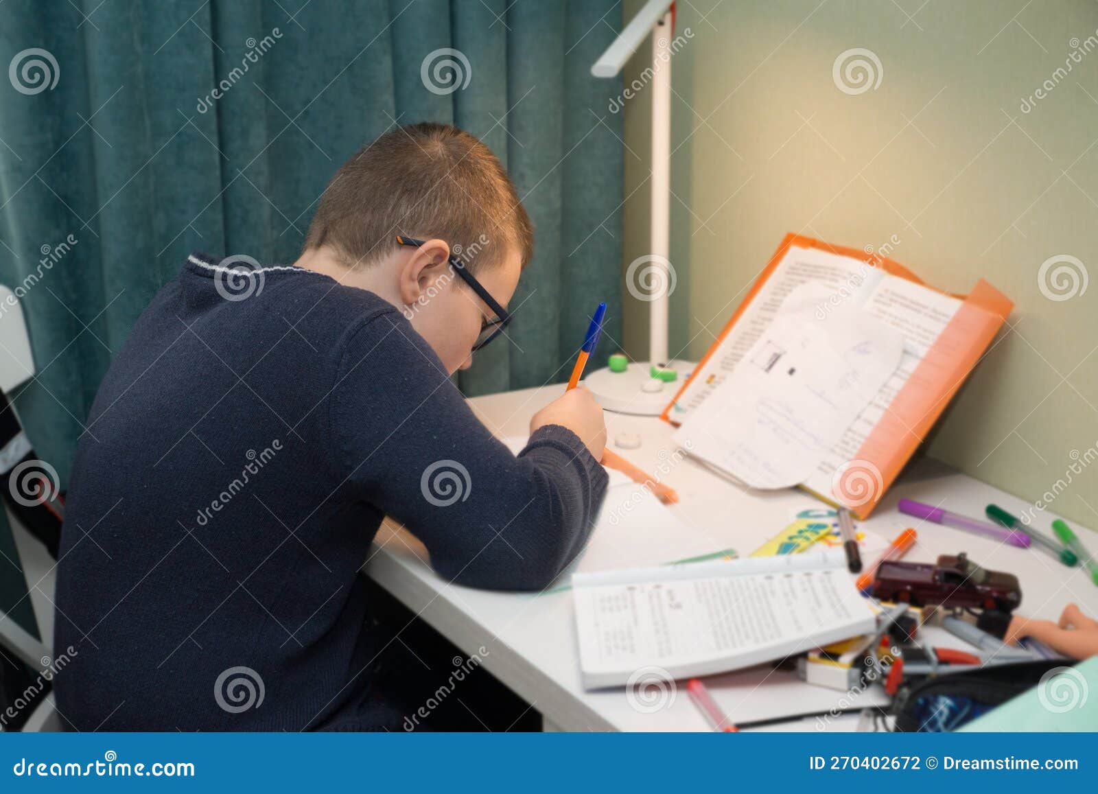 Student doing homework stock photo. Image of concentration - 270402672