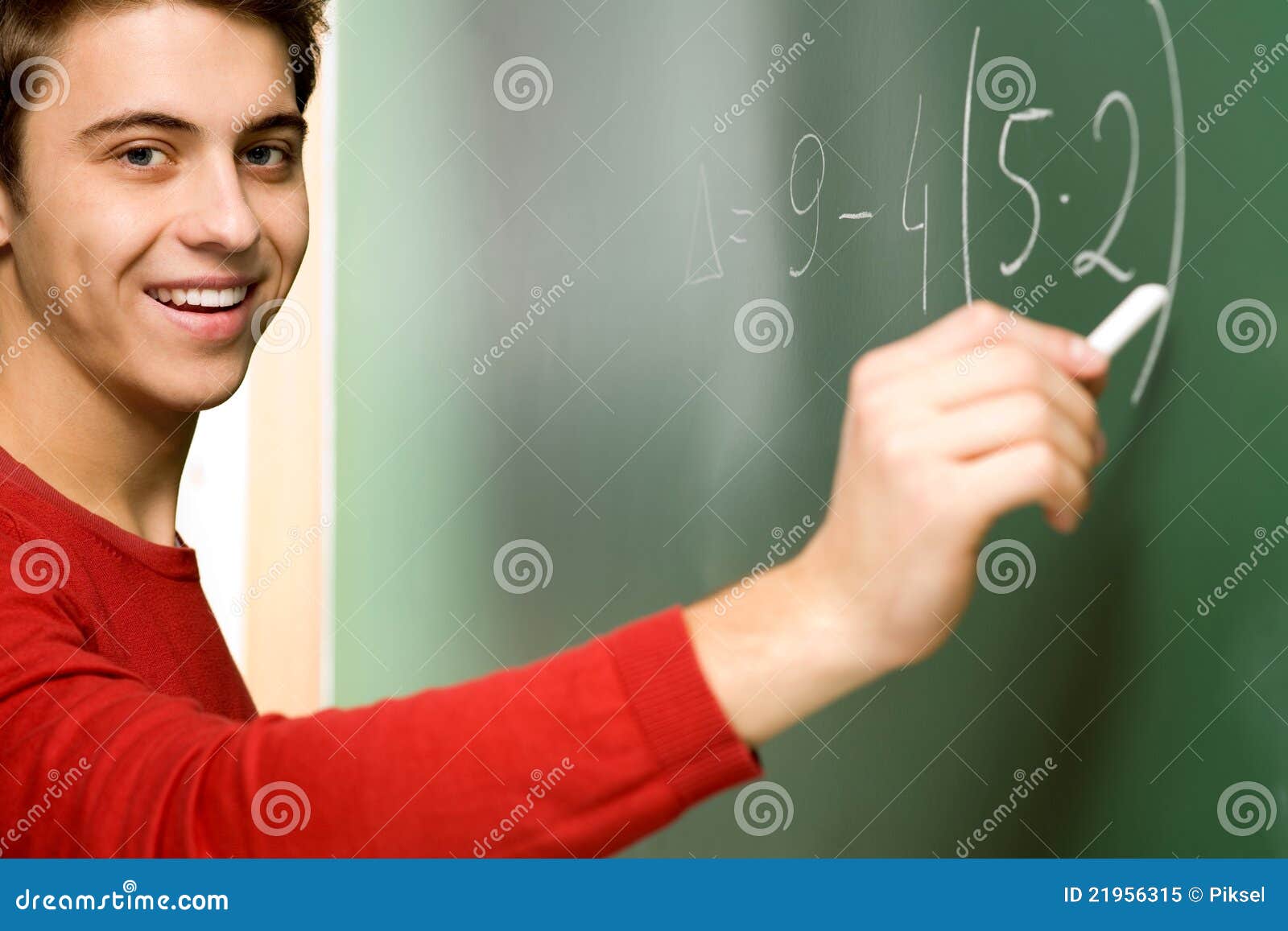 Student Doing Math on Chalkboard Stock Image - Image of holding ...