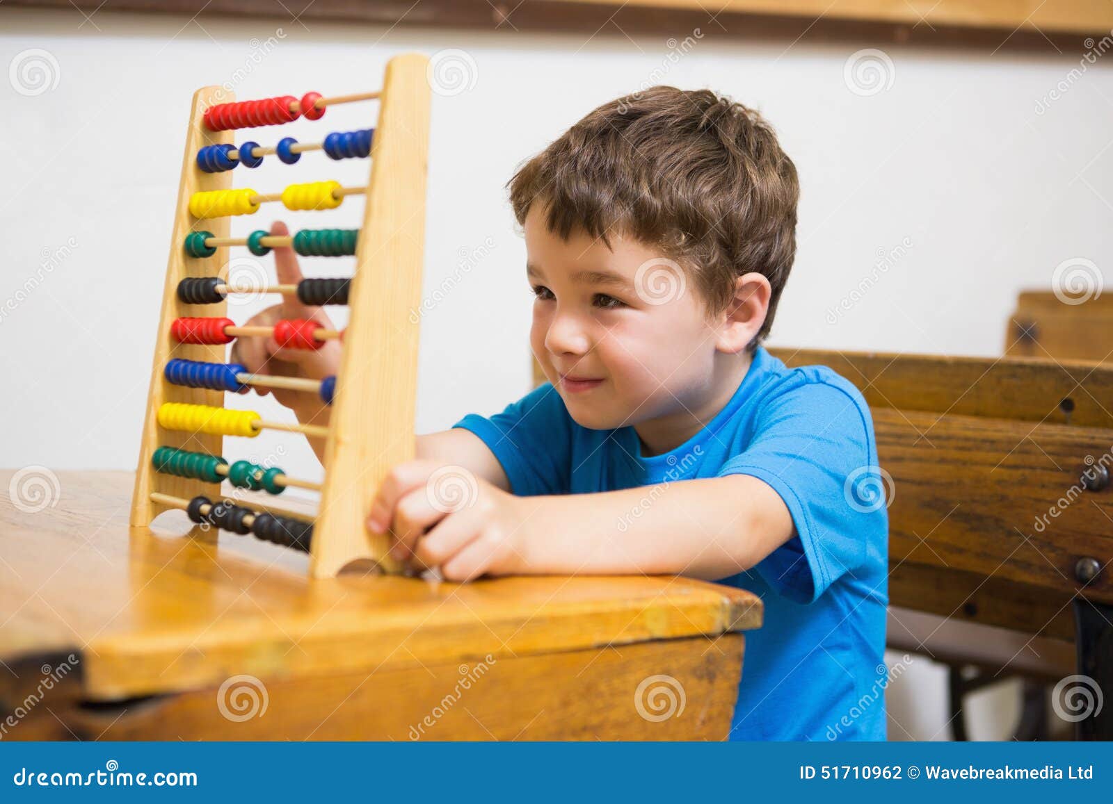 Student Doing Maths on Abacus Stock Photo - Image of book, child: 51710962