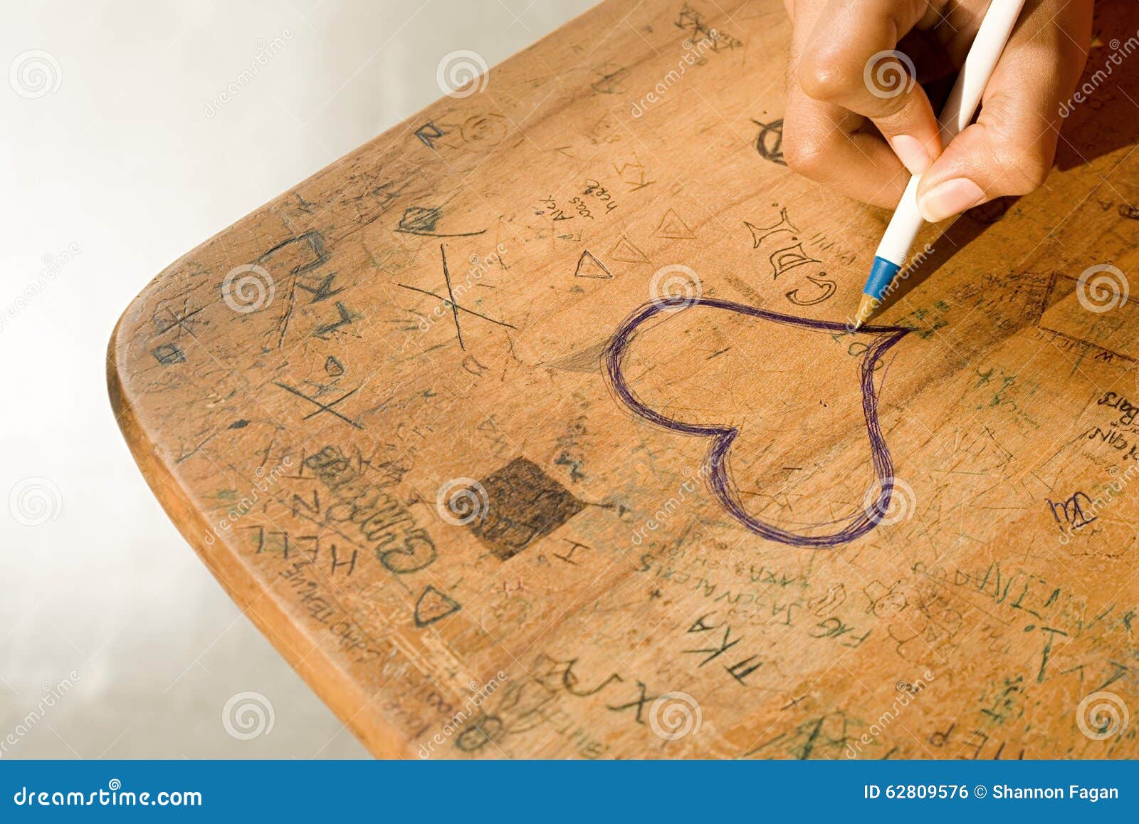 Student Drawing A Heart On Her Desk Royalty-Free Stock Image ...