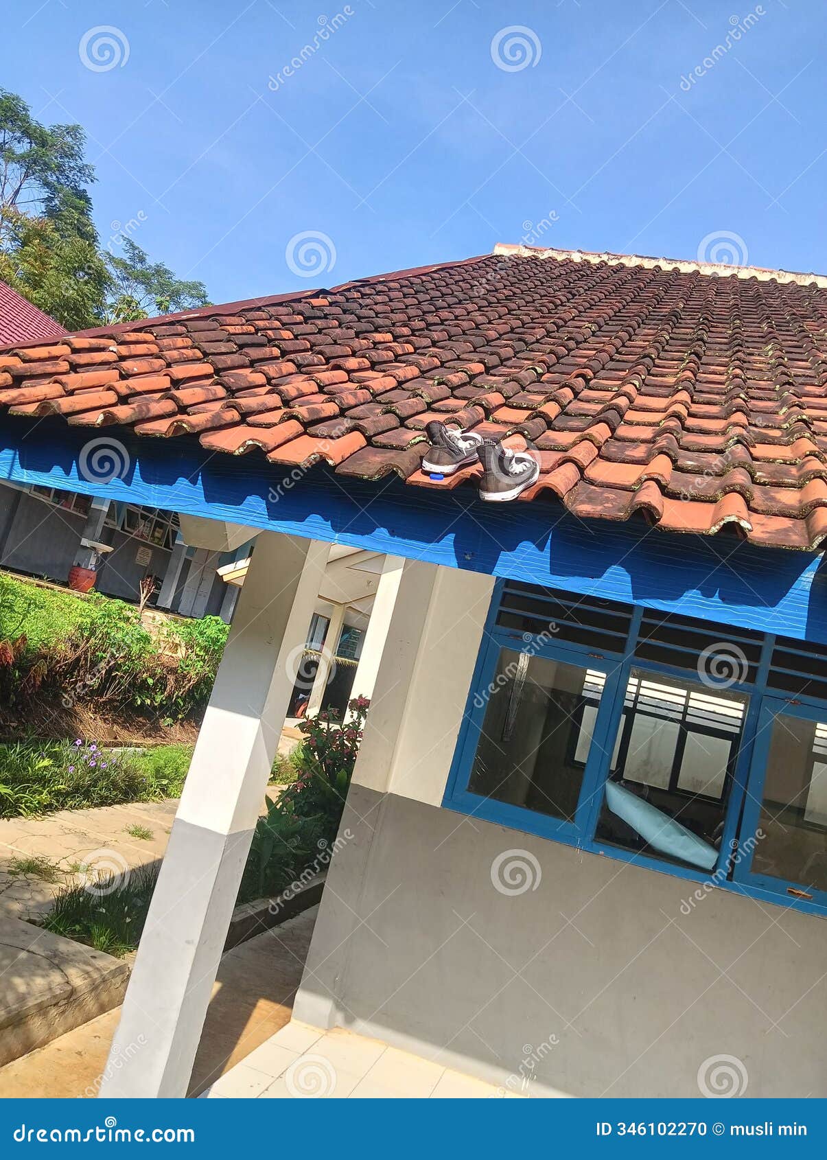 Man Using Heat Press Machine At Table Near Brick Wall, Closeup Stock ...