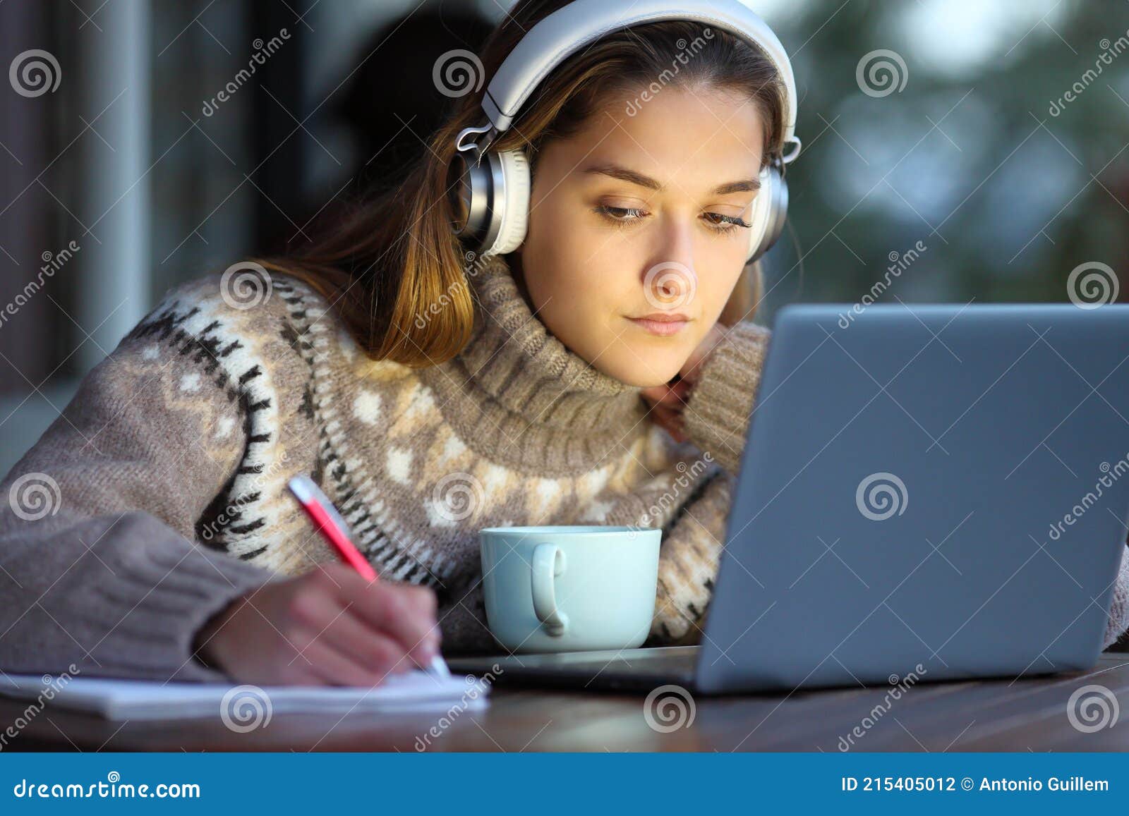 Student E-learning in a Coffee Shop in Winter Stock Photo - Image of ...