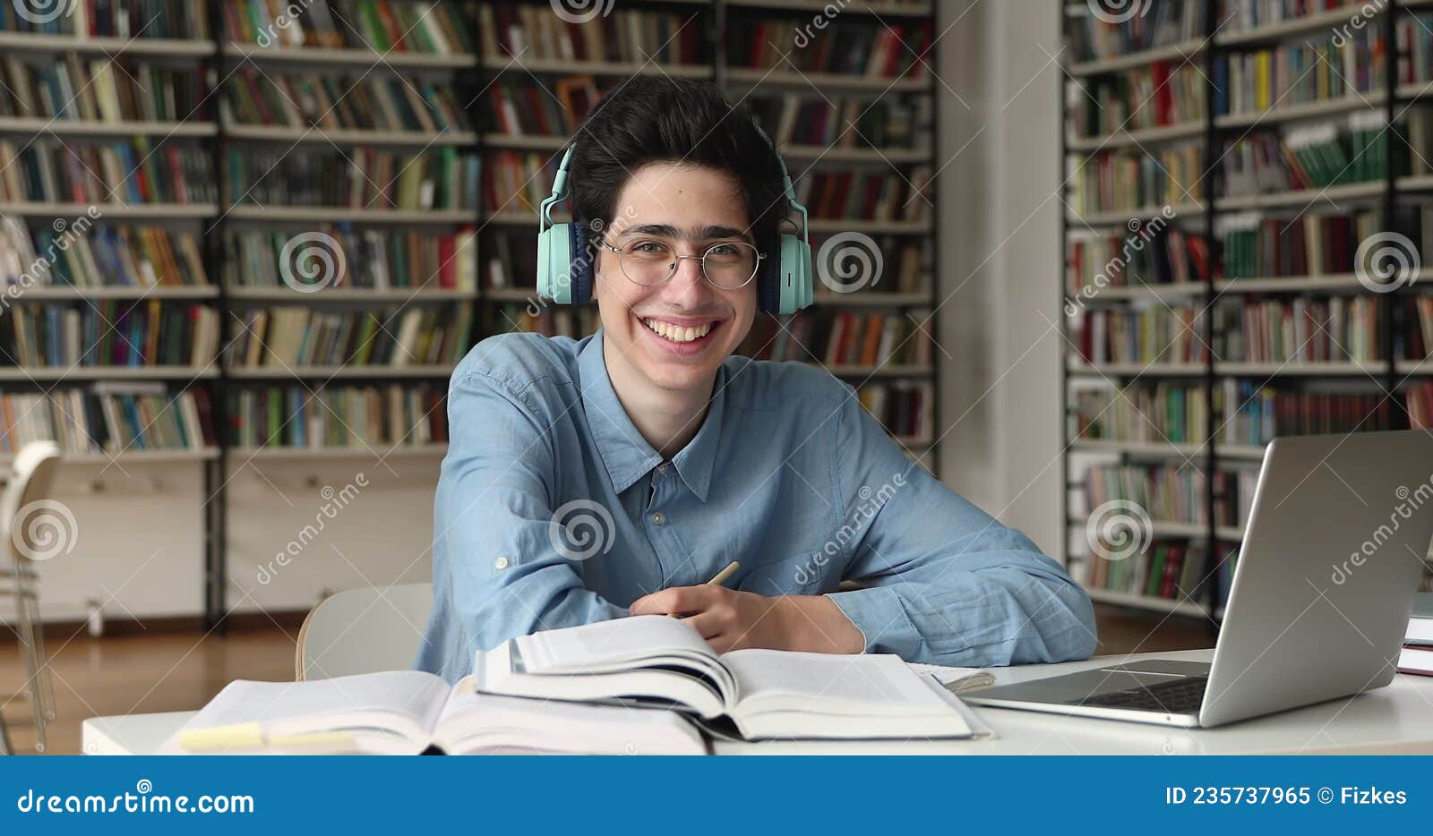 Student E-learning in College Library Smiling Posing Looking at Camera ...