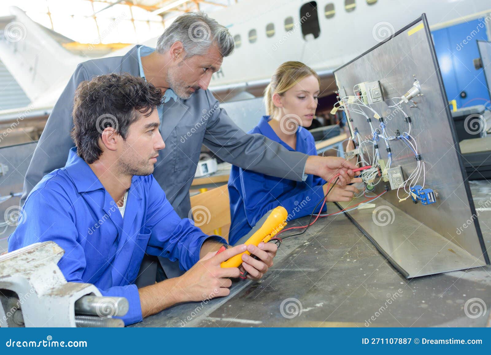 Student Electricians with Cables and Multimeter Stock Image - Image of ...