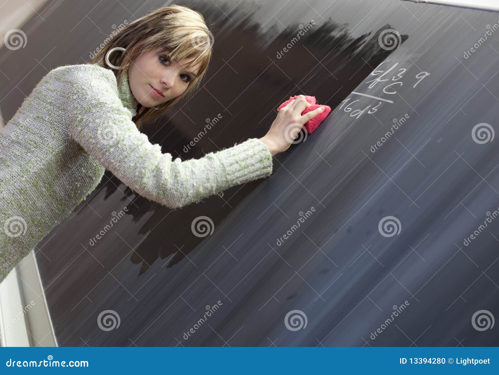 Student Erasing the Chalkboard/blackboard Stock Photo - Image of ...