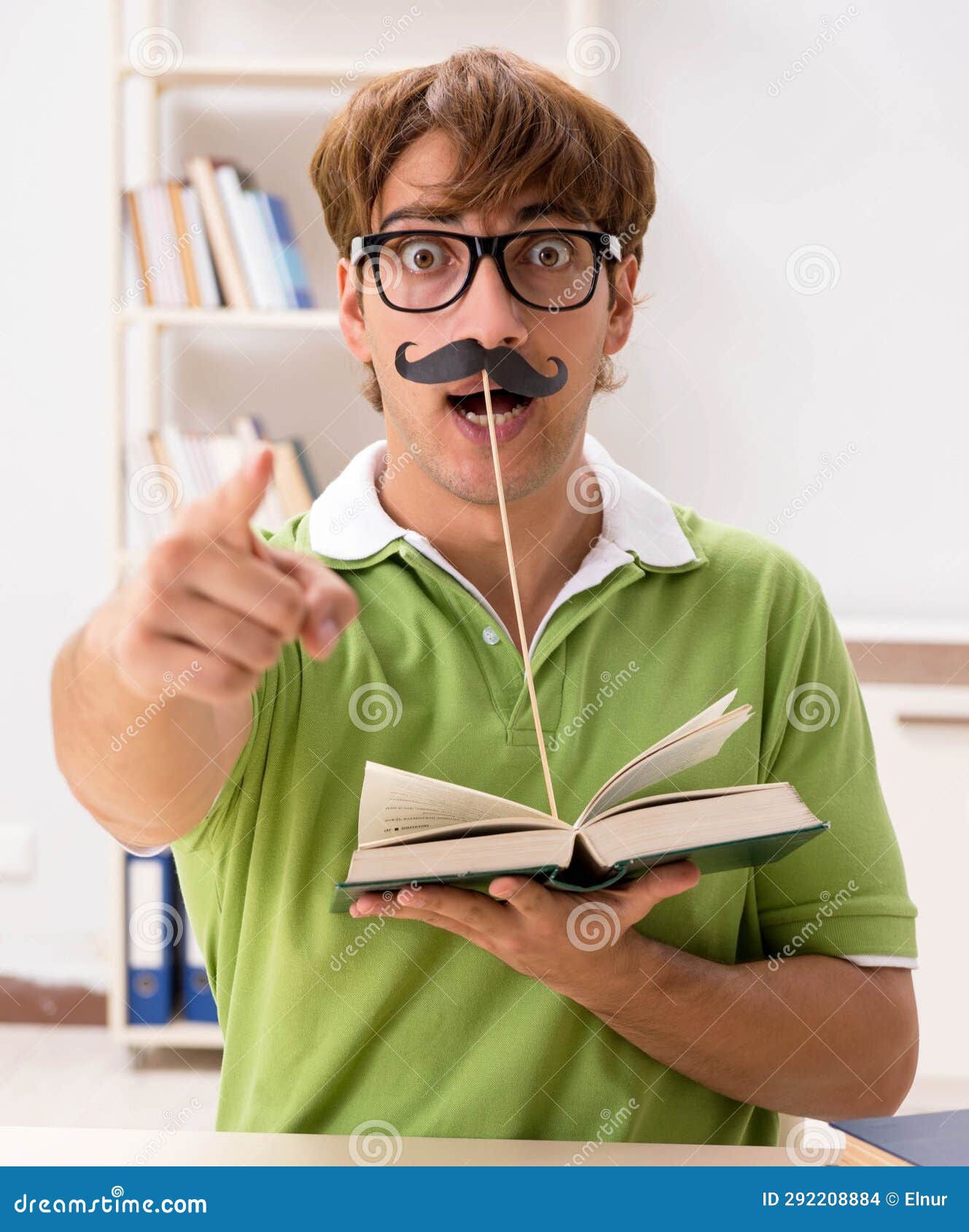 Student with Fake Moustache Reading Book Stock Photo - Image of comic ...