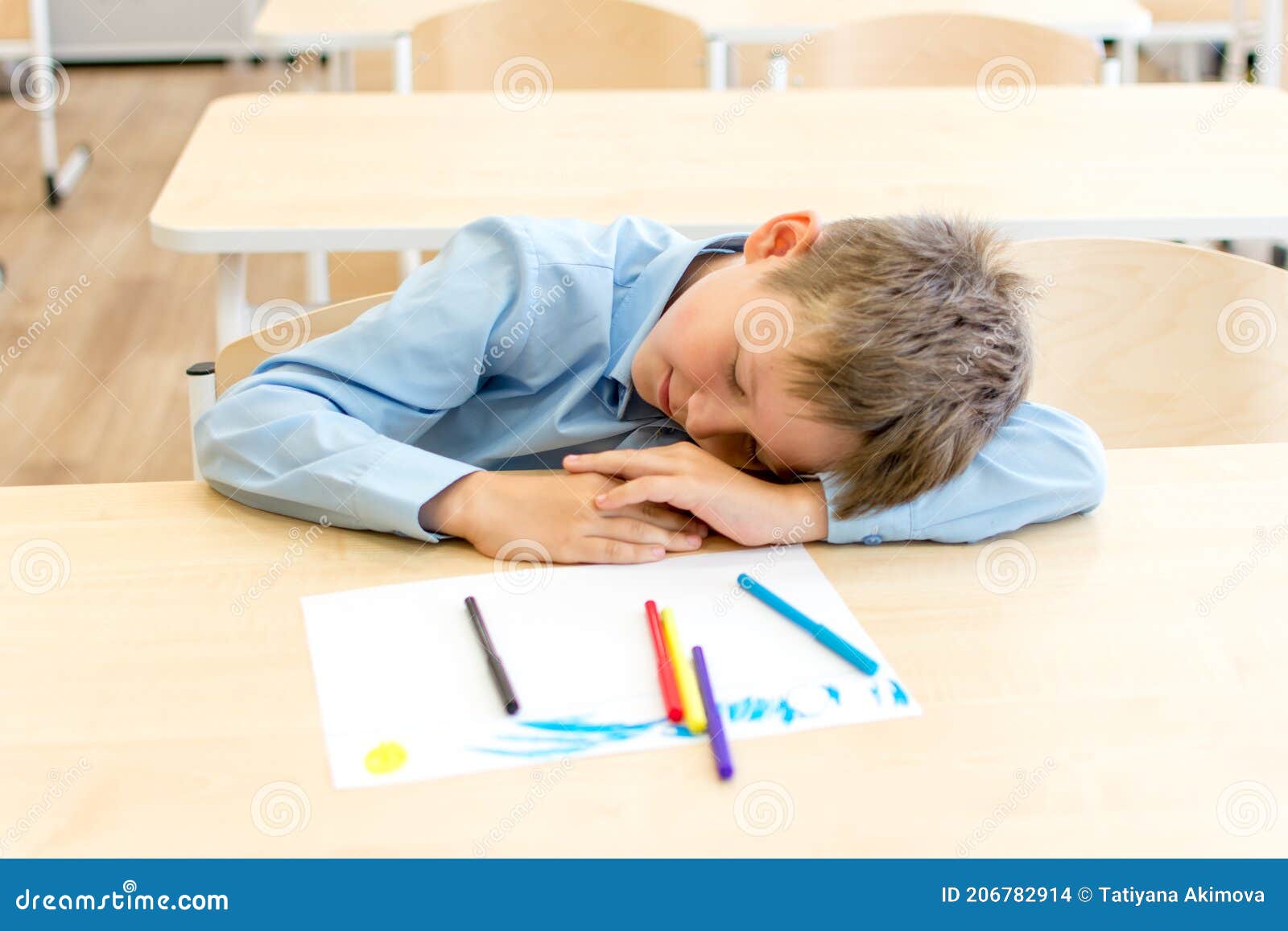 The Student Fell Asleep at His Desk, Tired of Knowledge. Stock Photo ... The Student Fell Asleep at His Desk, Tired of Knowledge. Stock Photo ...